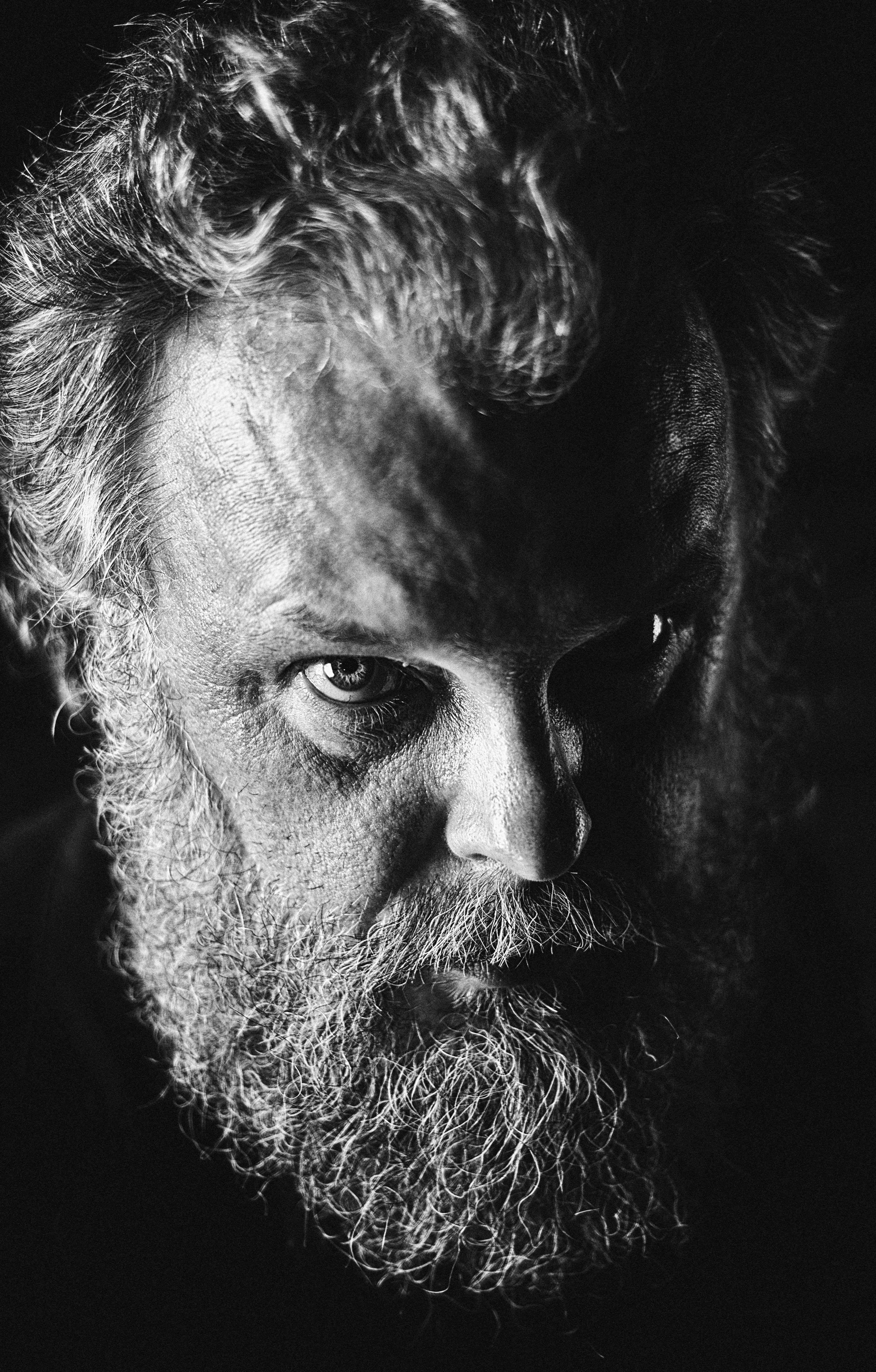 Midnight Gaze: A Piercing Portrait in Shadow and Steel