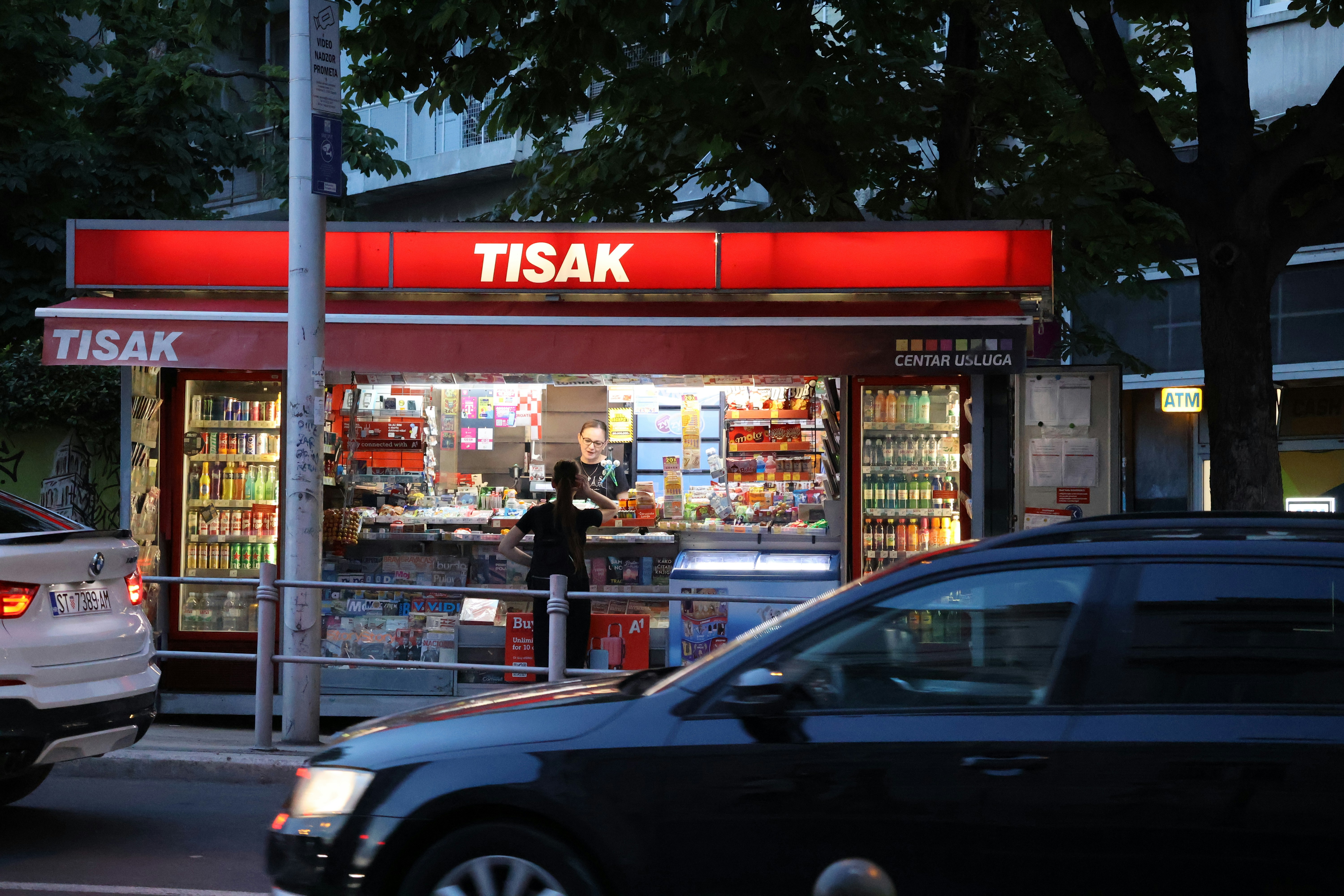 Red Convenience: Evening Stall Brimming with Everyday Goods