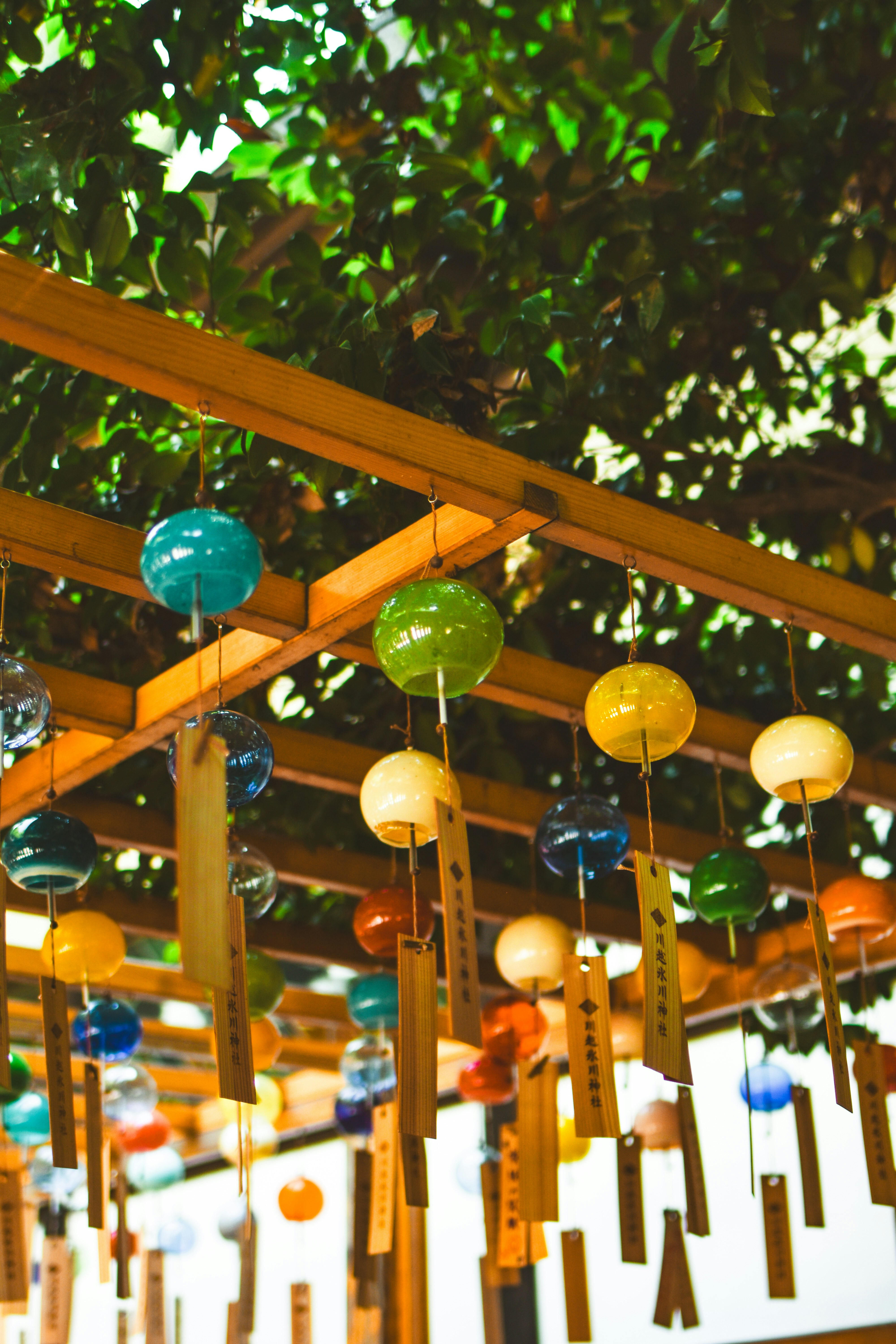 Floating Orbs Under Golden Veranda