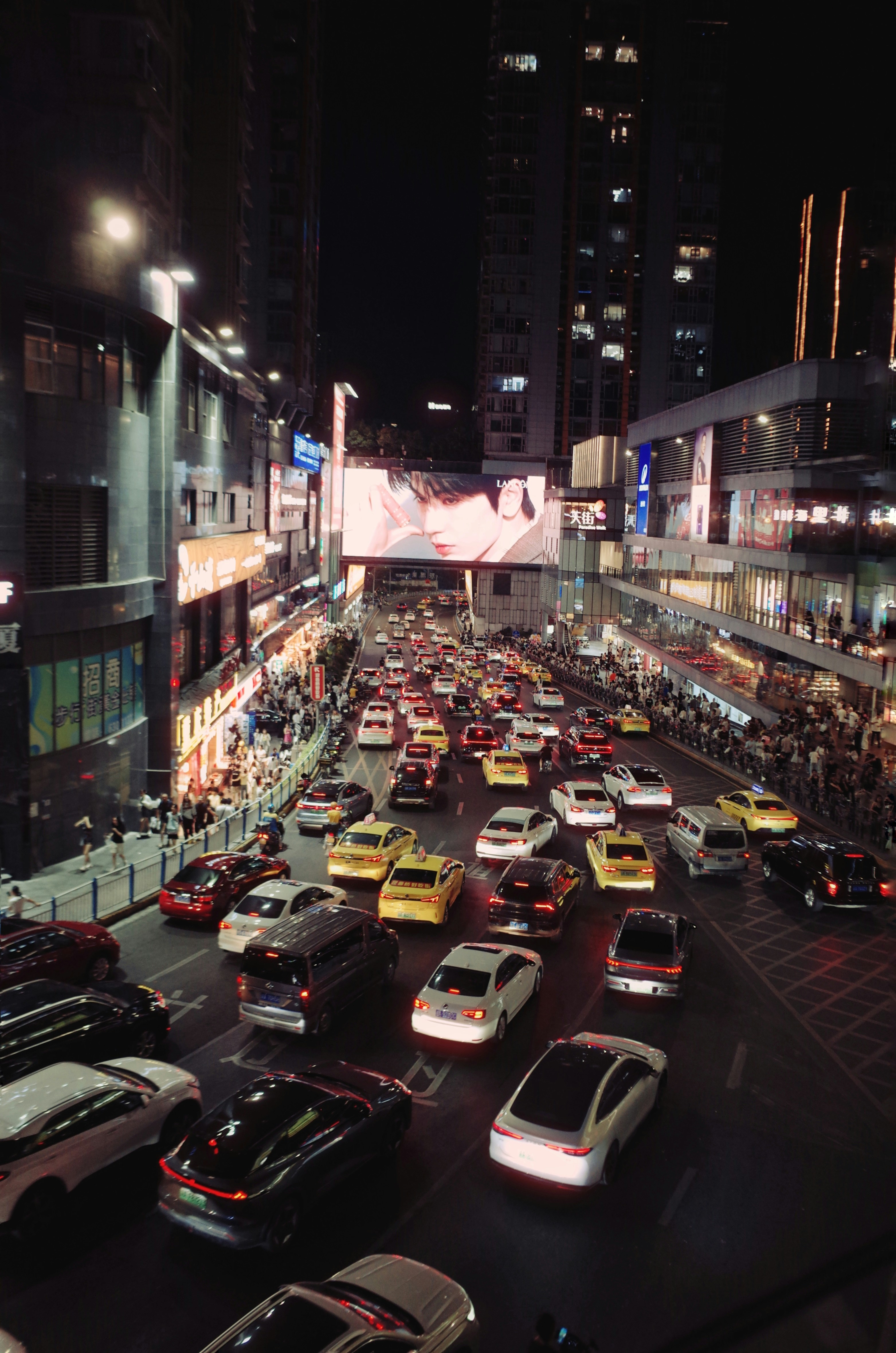 Neon River of Cars: A Night in the Urban Thrum