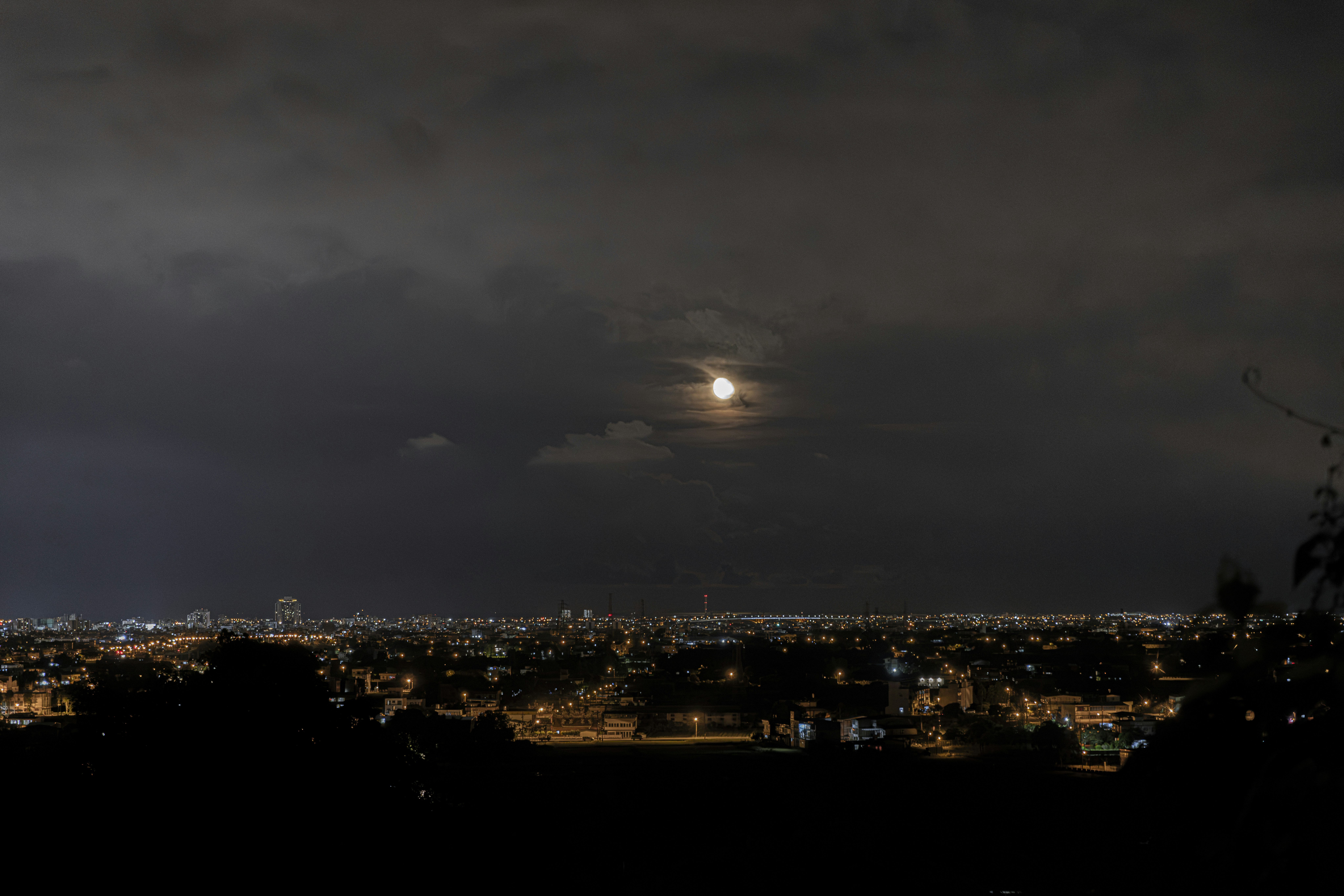 Moonlit City Veil Over Quiet Hills