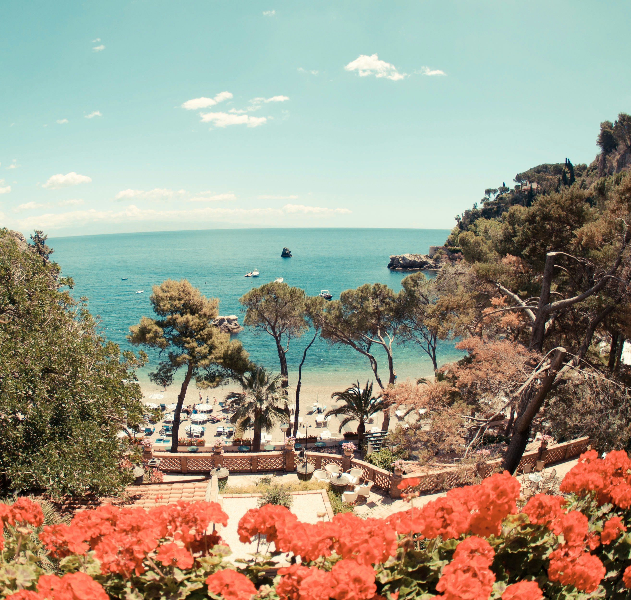 Taormina. A nostalgic 2013 travel photography collection captured with a Nikon camera by @Mariogogh, showcasing the timeless landscapes of Sicily. Featuring the ancient streets of Taormina, the majestic silhouette of Mount Etna, and the stunning Greek ruins of Agrigento, this series reflects authentic Italian heritage, Mediterranean charm, and classic film-like analog tones.