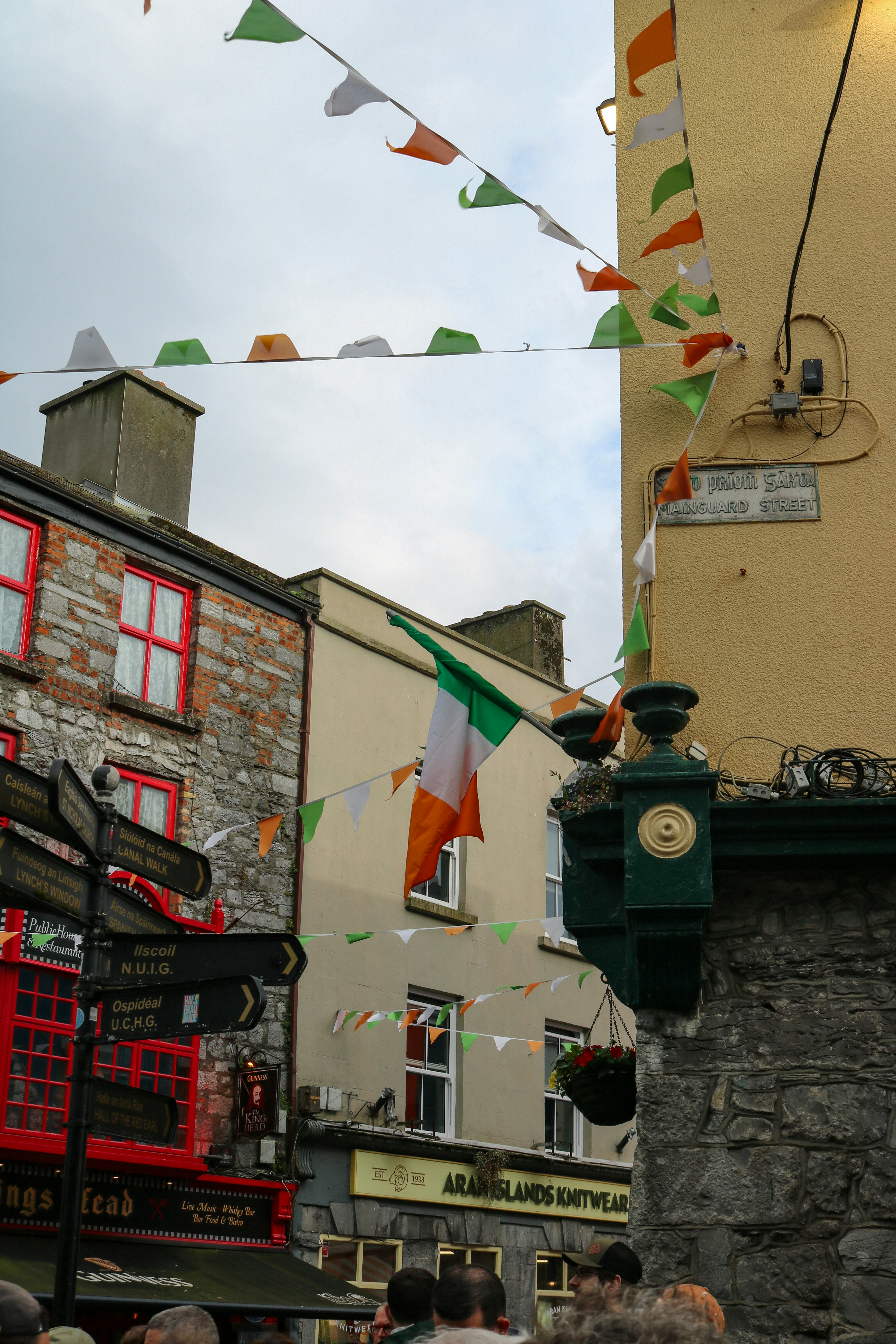 Festooned Irish Street: Flags, Signage, and Old-world Facades
