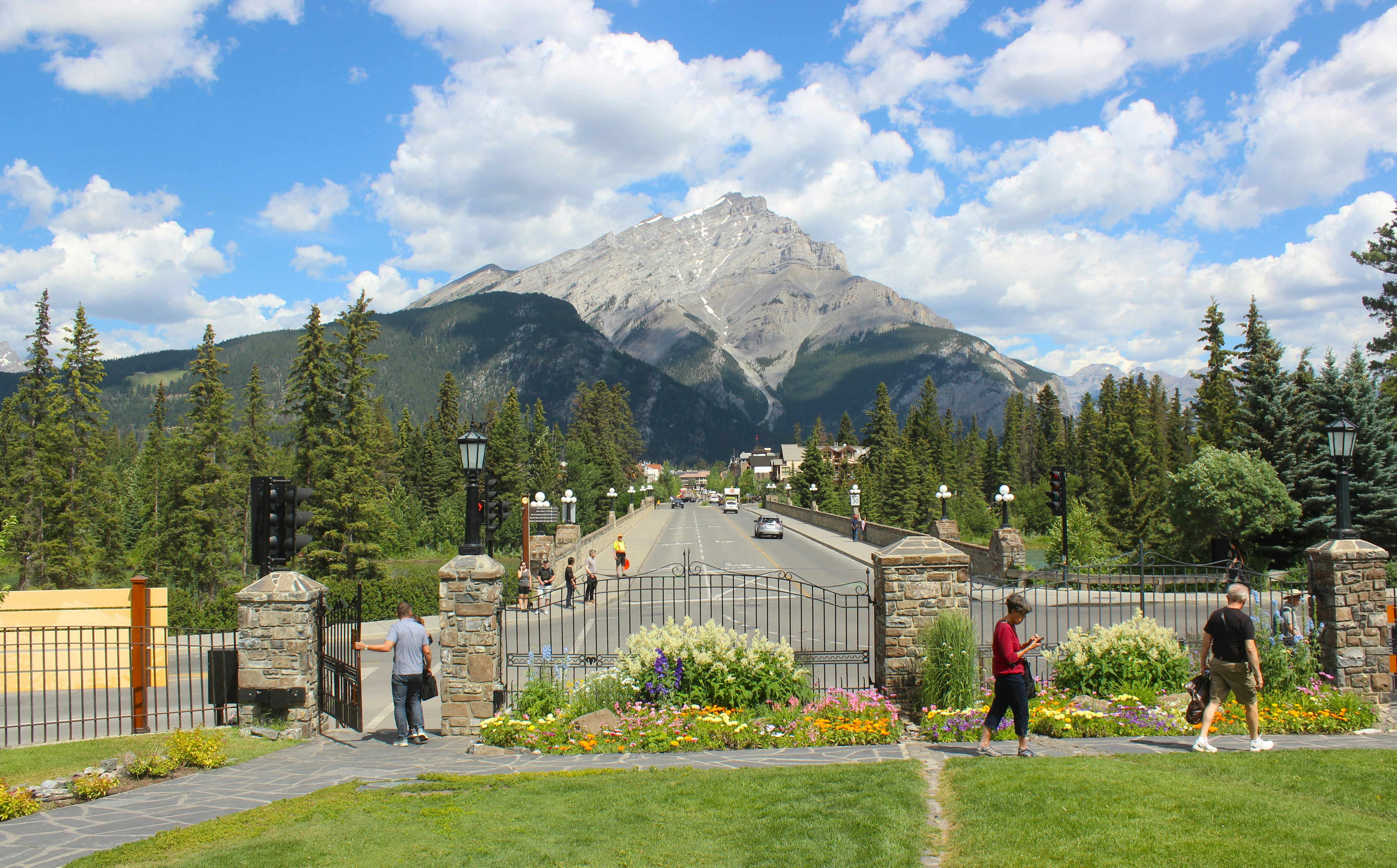 Stone Gate to a Snow-Capped Summit