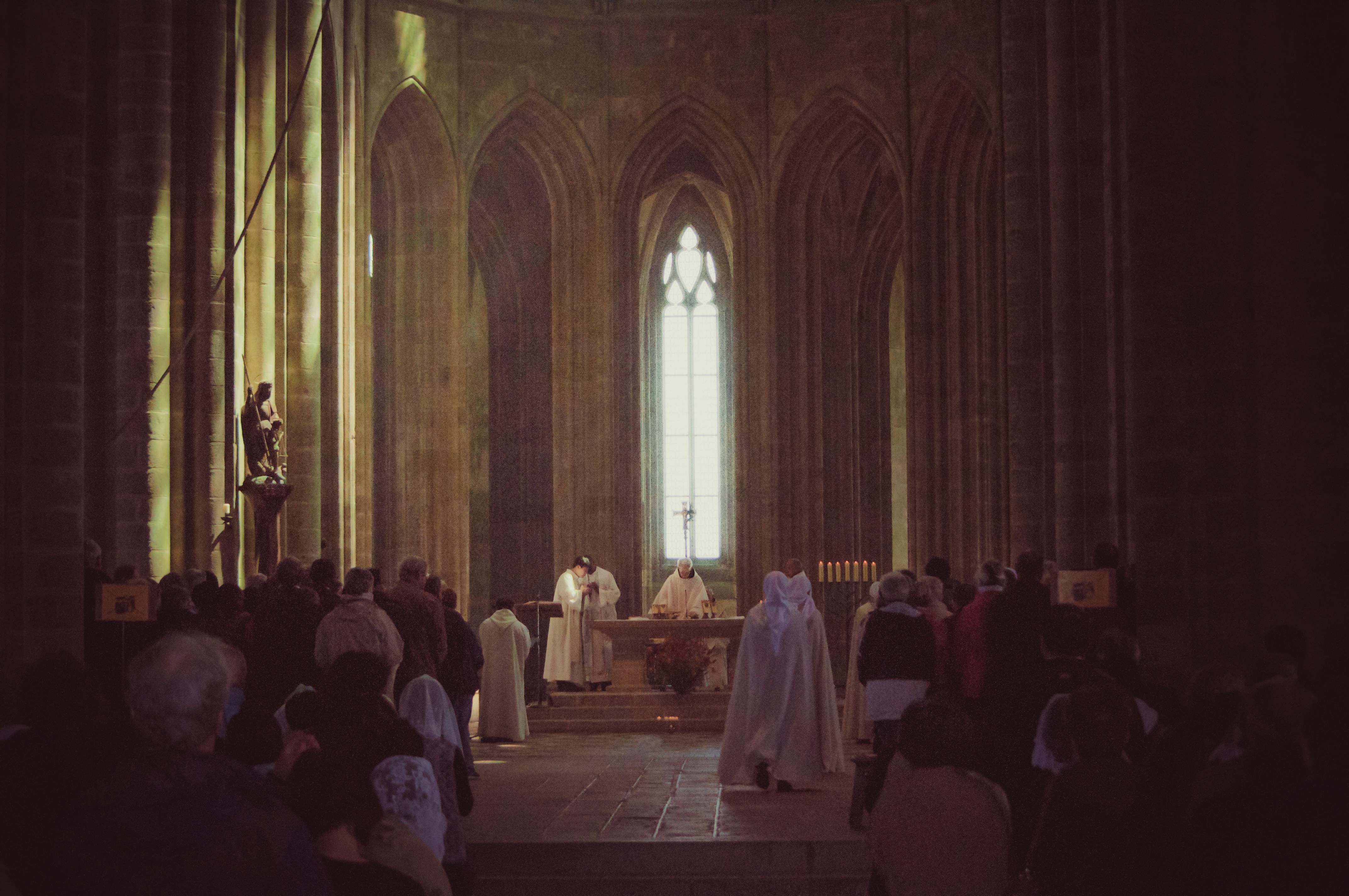 Hushed Reverence Beneath Gothic Arches