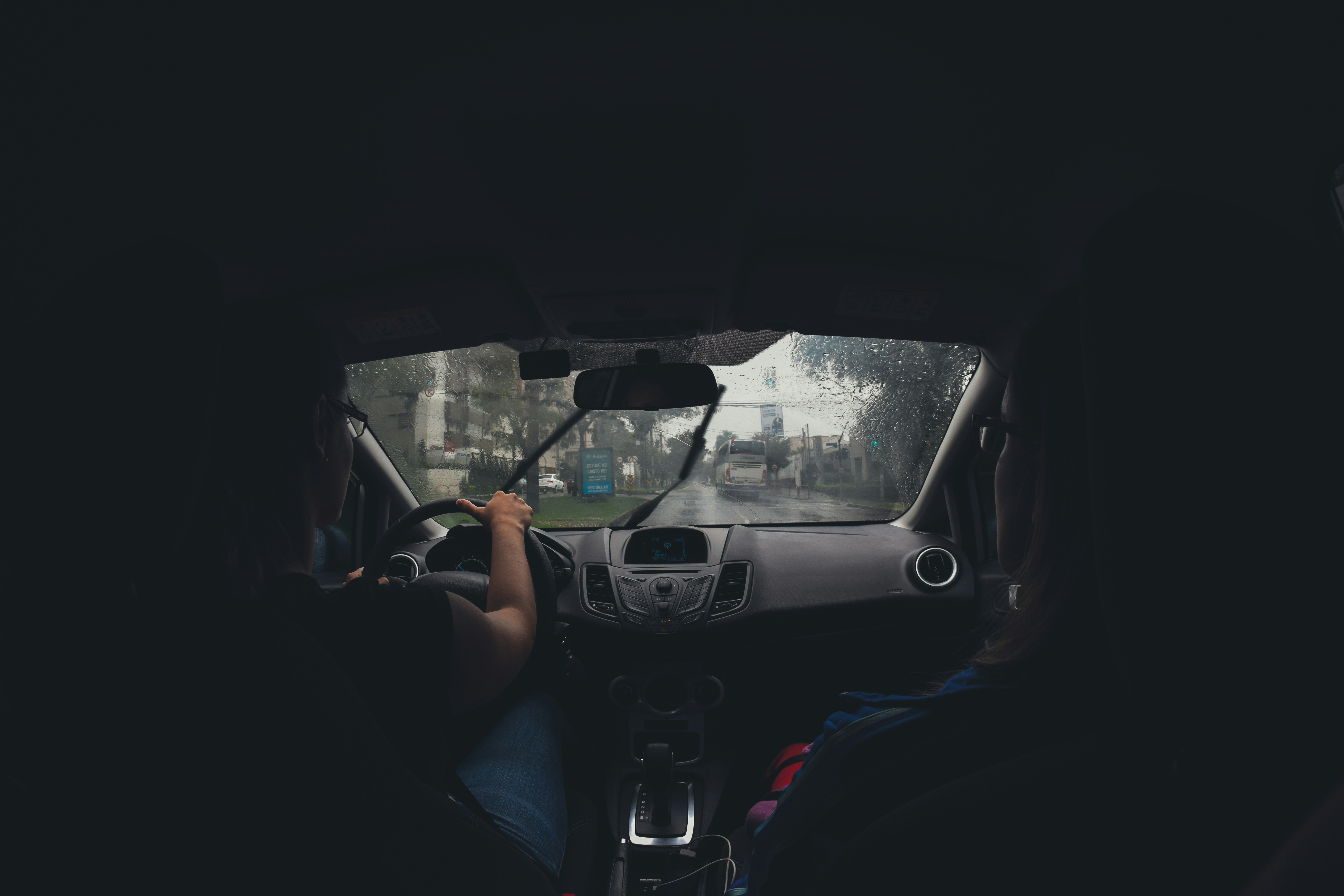 Front-seat Focus: A Dim Drive Through a Narrow Car Cabin