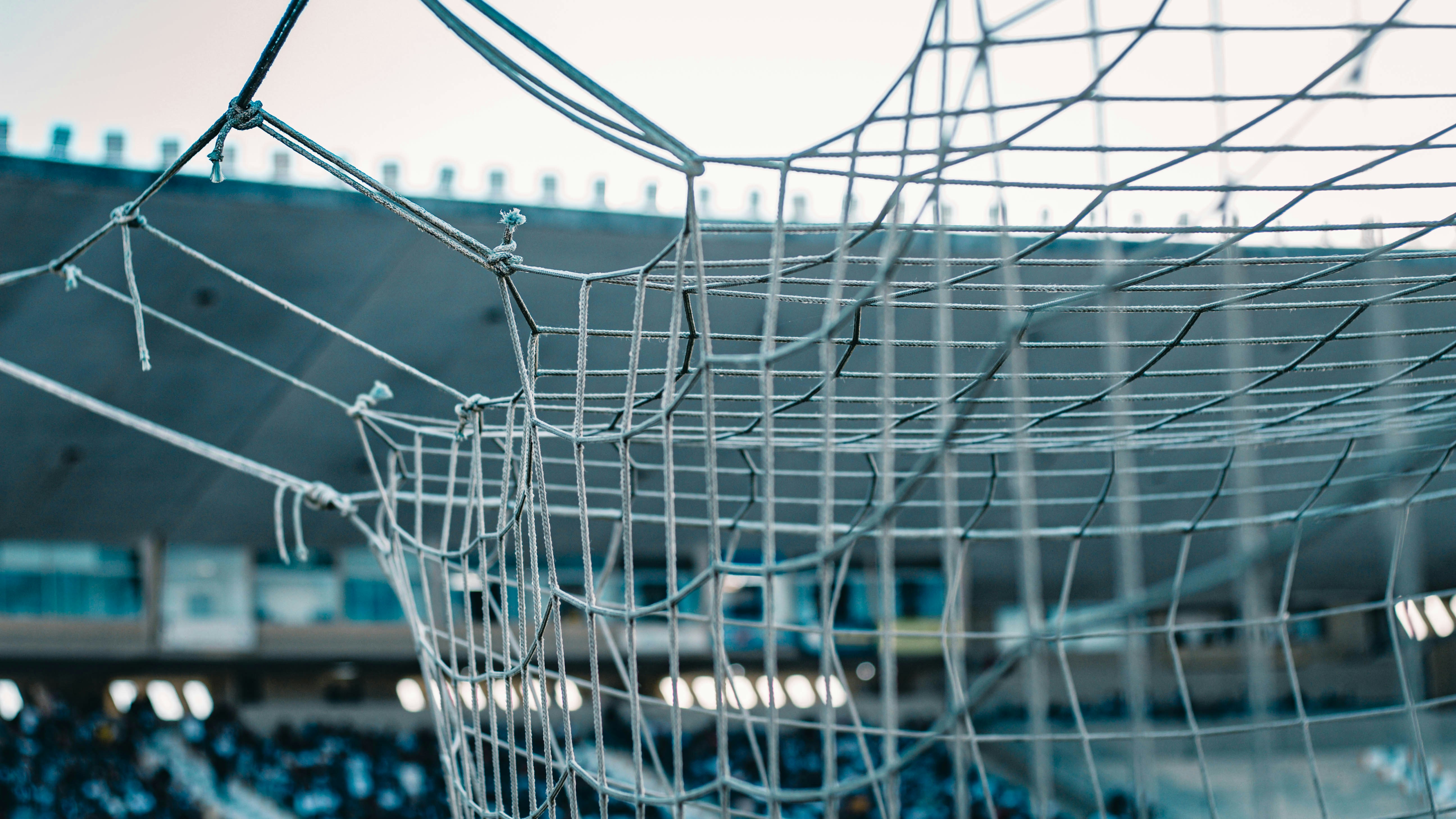 Forgotten Net: A Close-Up of Frayed Ridgeline in the Stadium