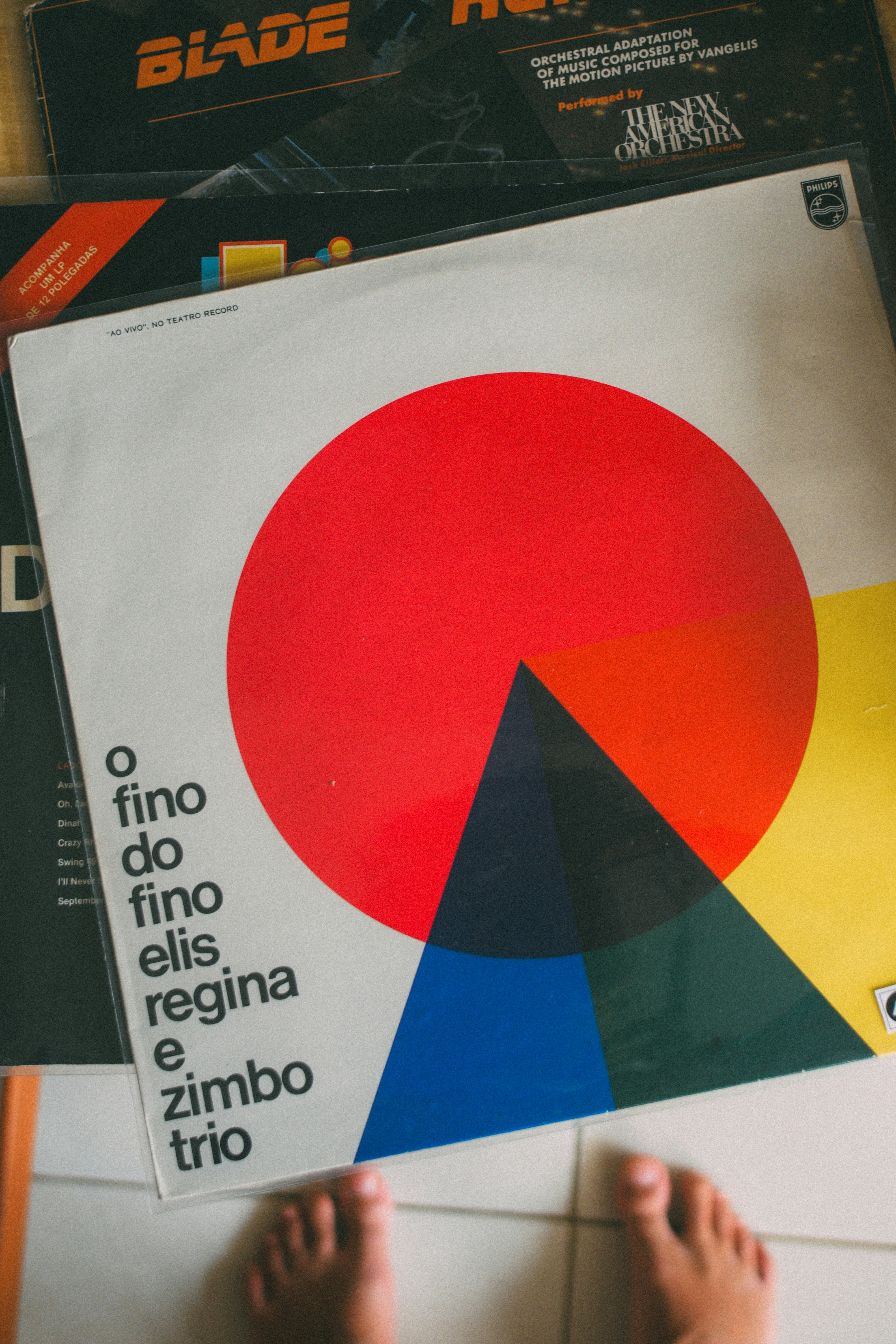 Abstract Sun and Triangle: A Colorful Album Cover Cornerstone