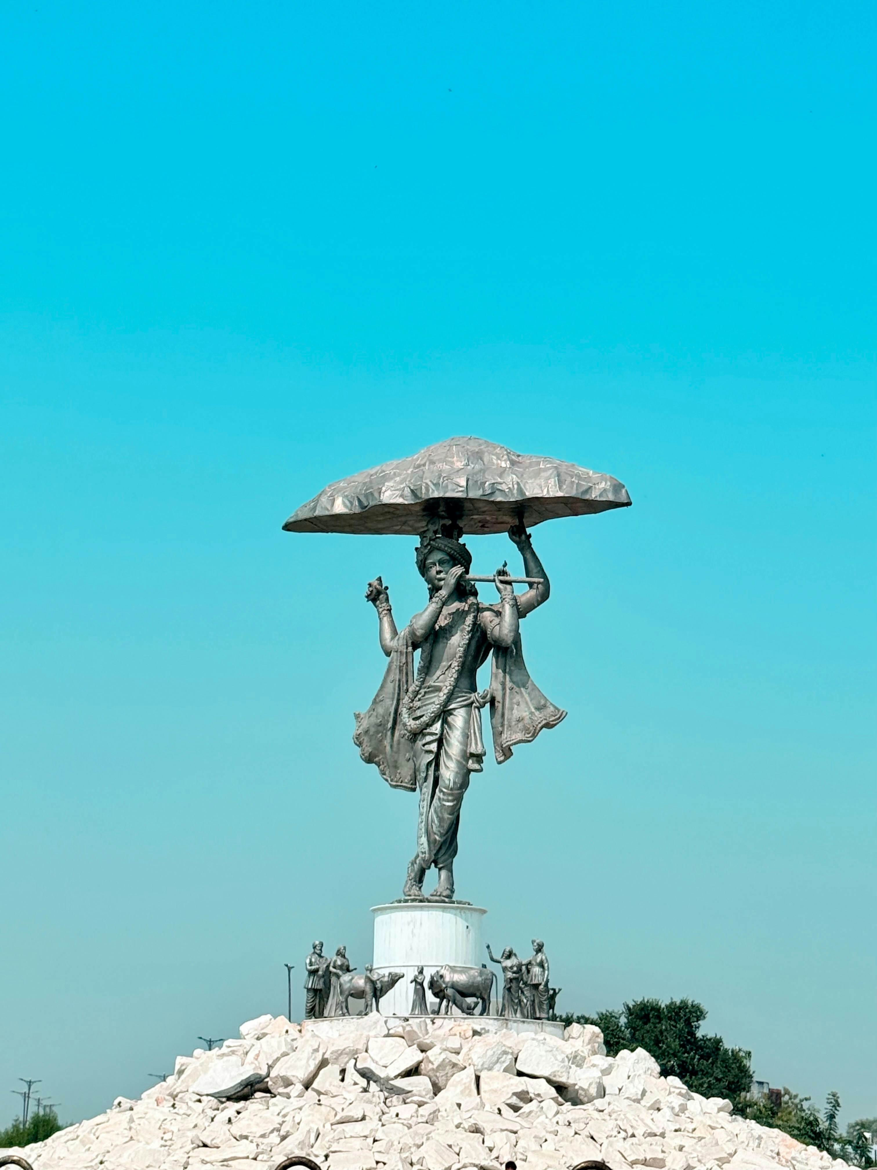 Guardian of the Stone: A Monumental Silhouette Against a Cerulean Sky