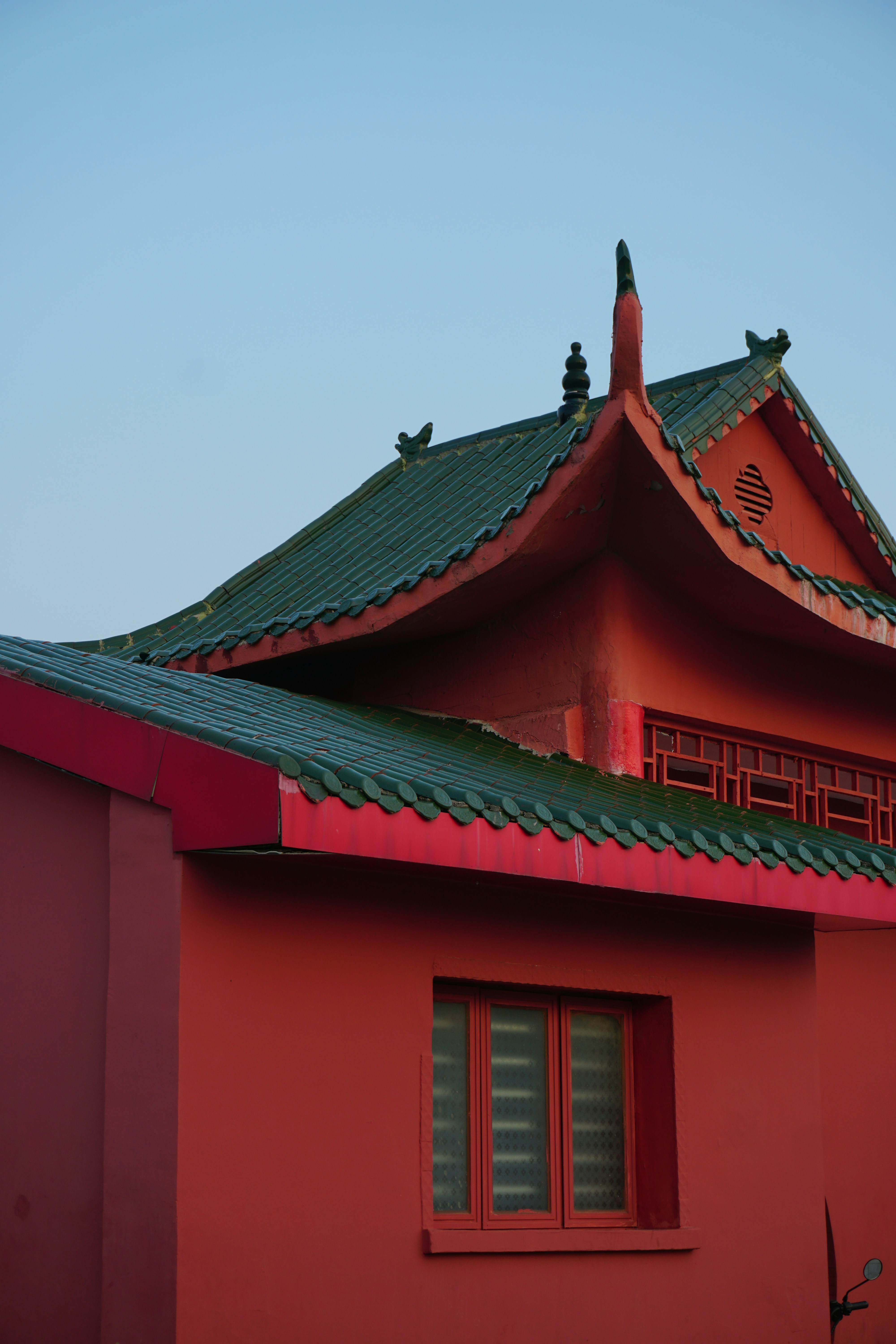Crimson Temple Angles: A Rooftop Symphony