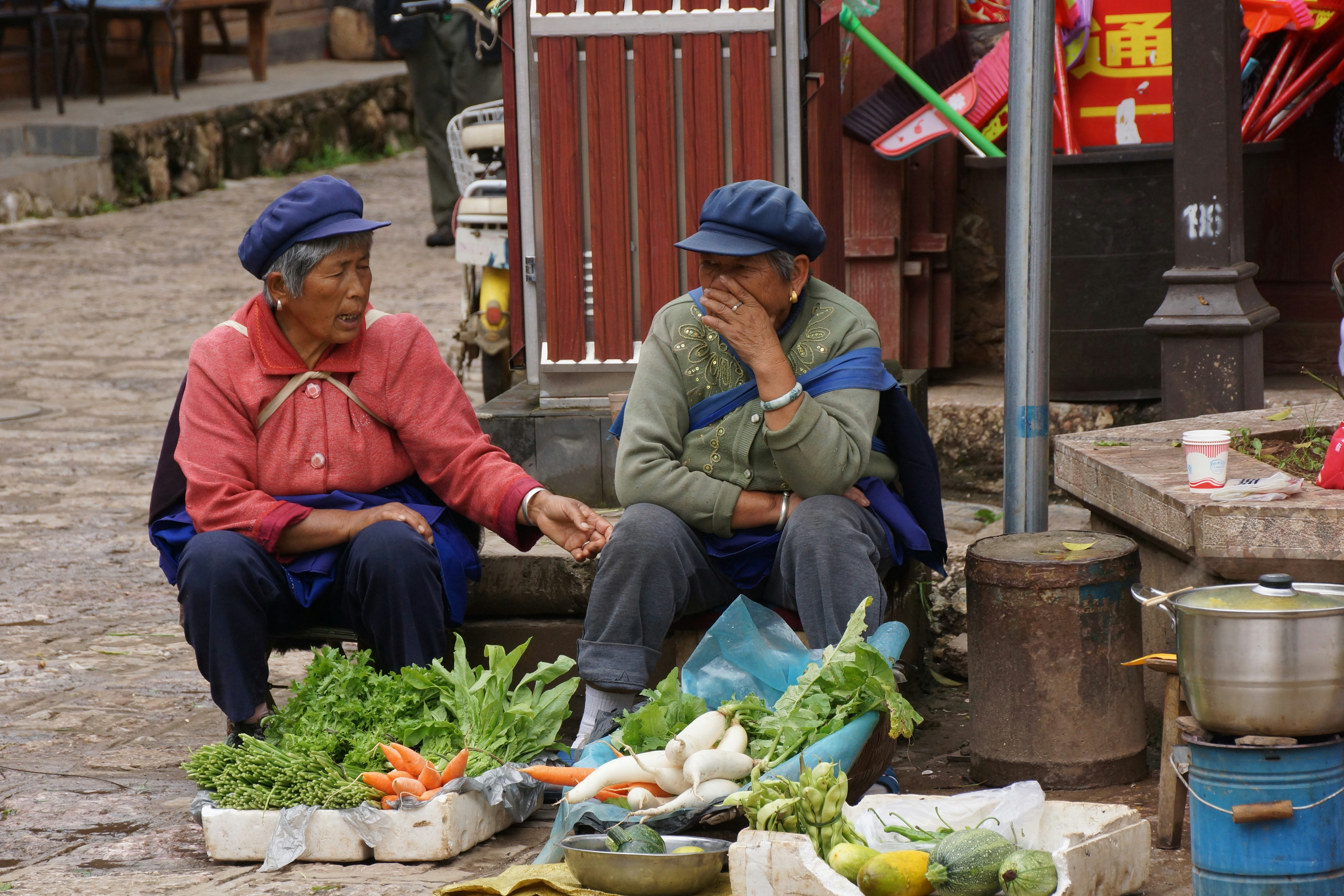 Market Gurus of the Alley: Shared Quiet Amid Greens and Grains