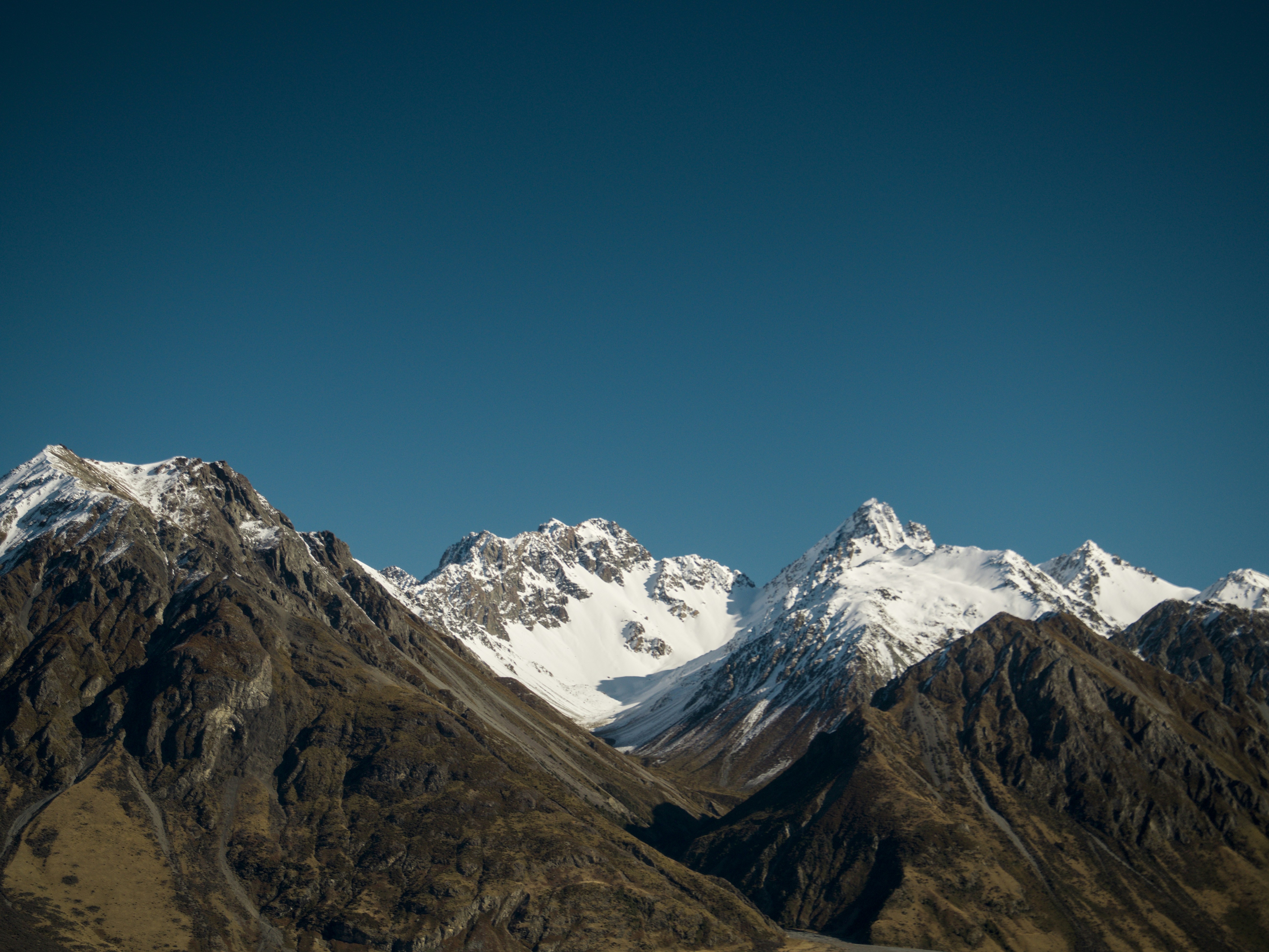 Snow-capped Ridge Beneath a Cerulean Sky