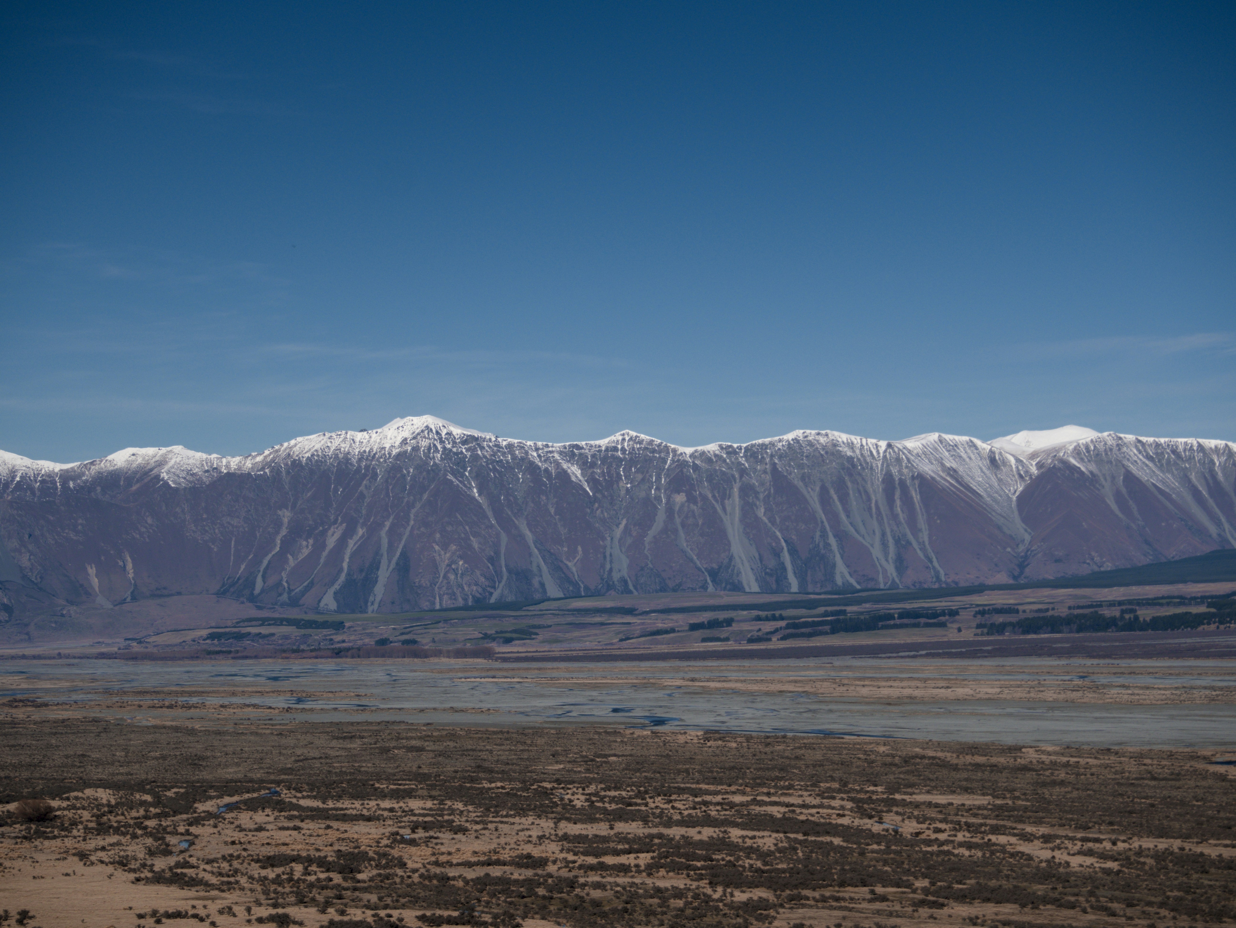 Snow-Trimmed Ridge at Distant Horizon