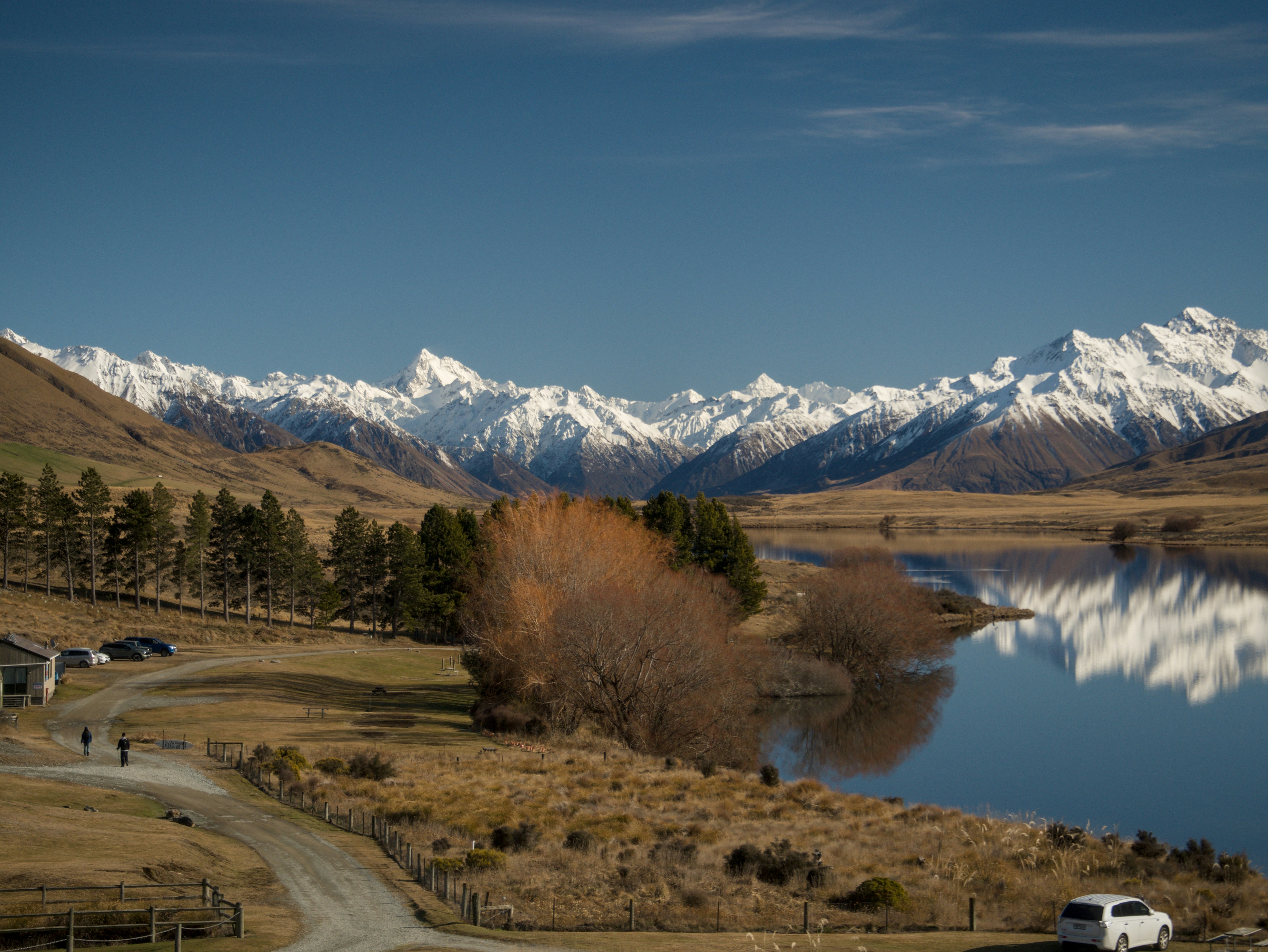 Snow-Capped Silence: A Valley Mirror by the Lake