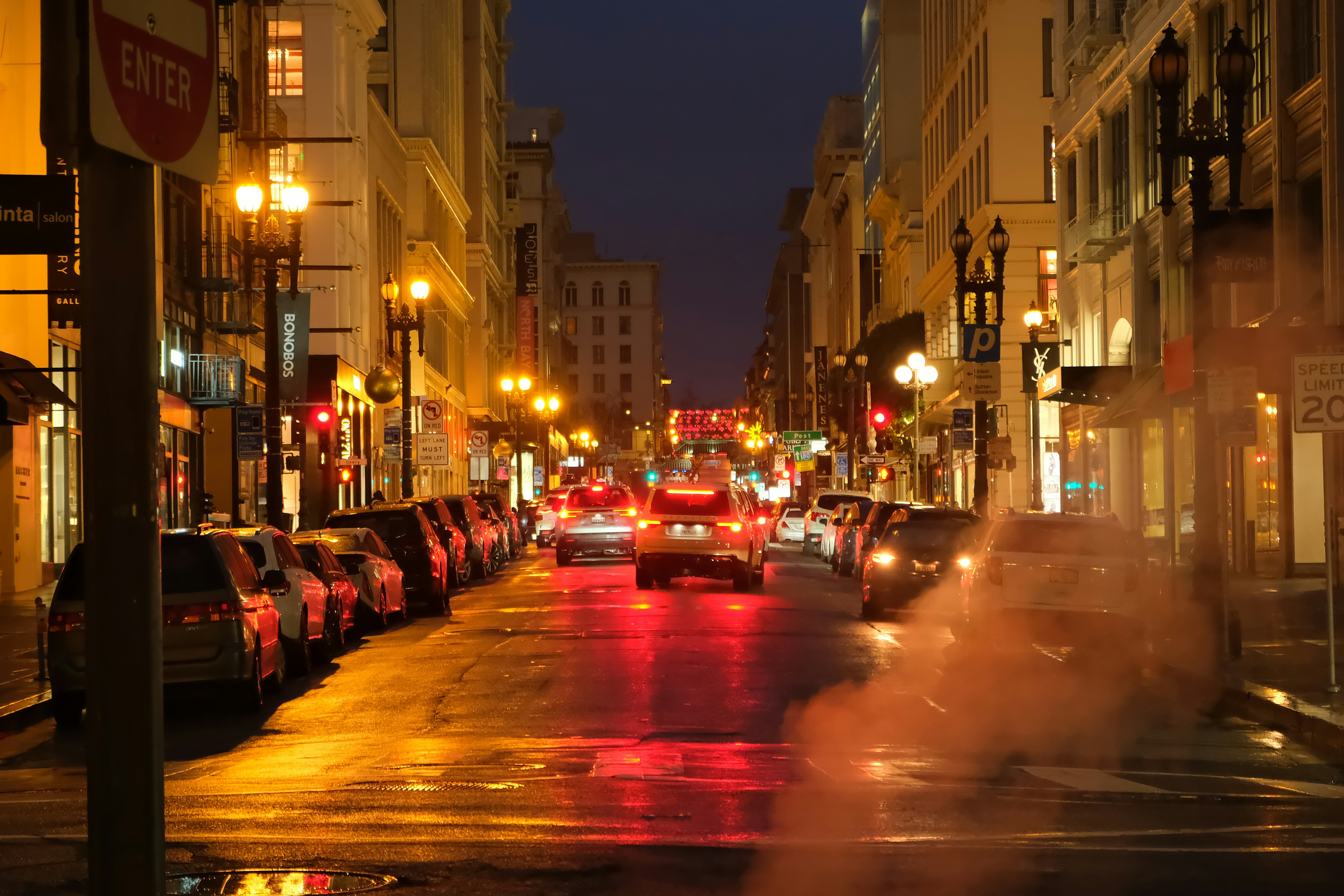 Urban Steam and Neon Ribbons: Night Streets in Motion