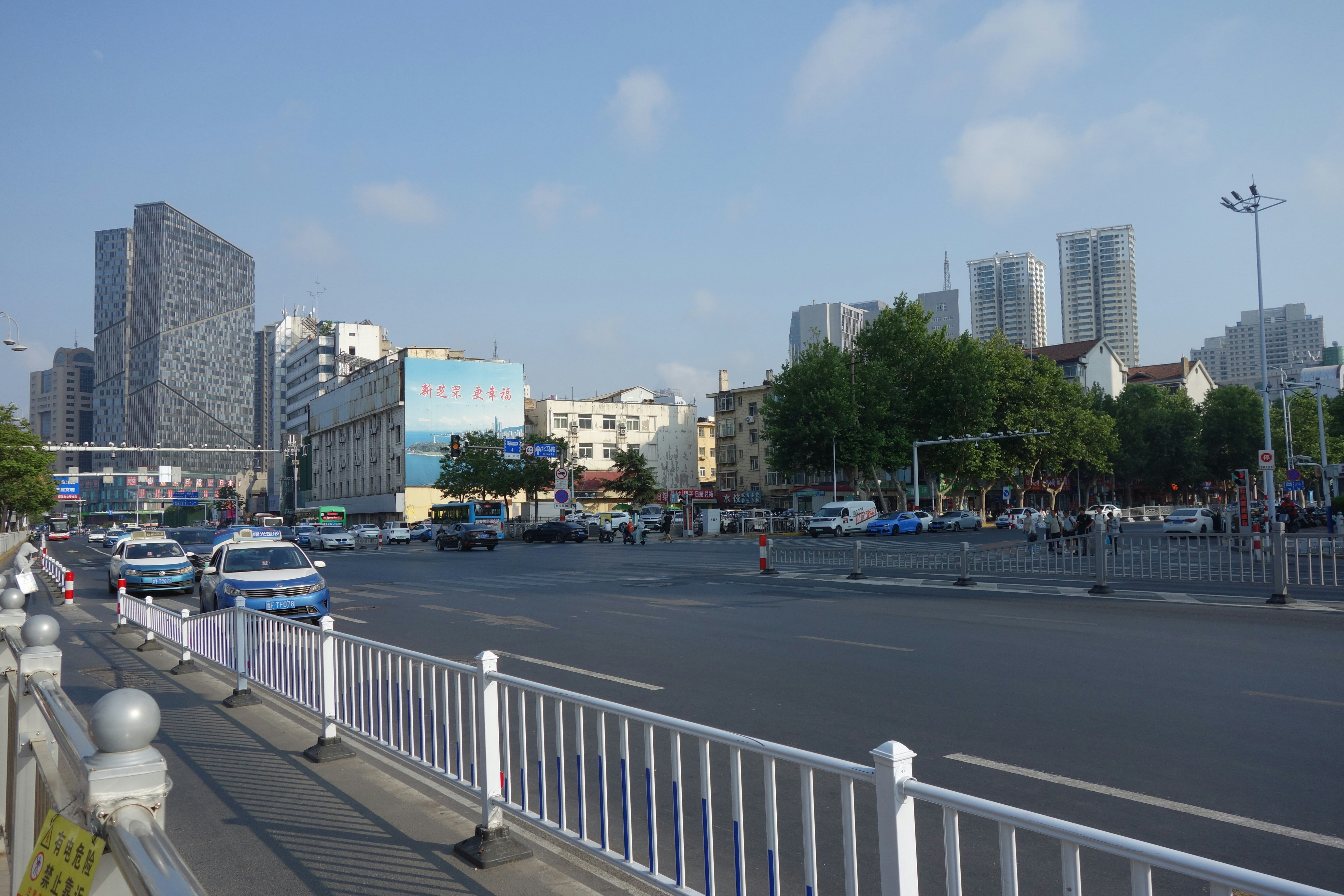 City Arc: A Sunlit Boulevard Framed by Modern Towers