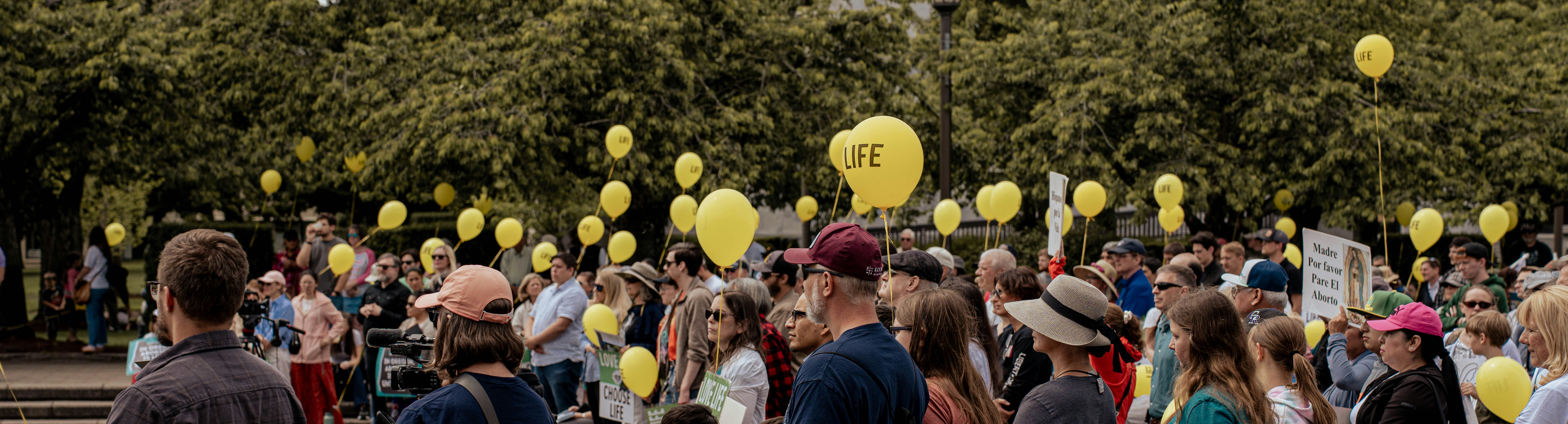 Yellow Balloon Parade: A Sea of Balloons and Faces