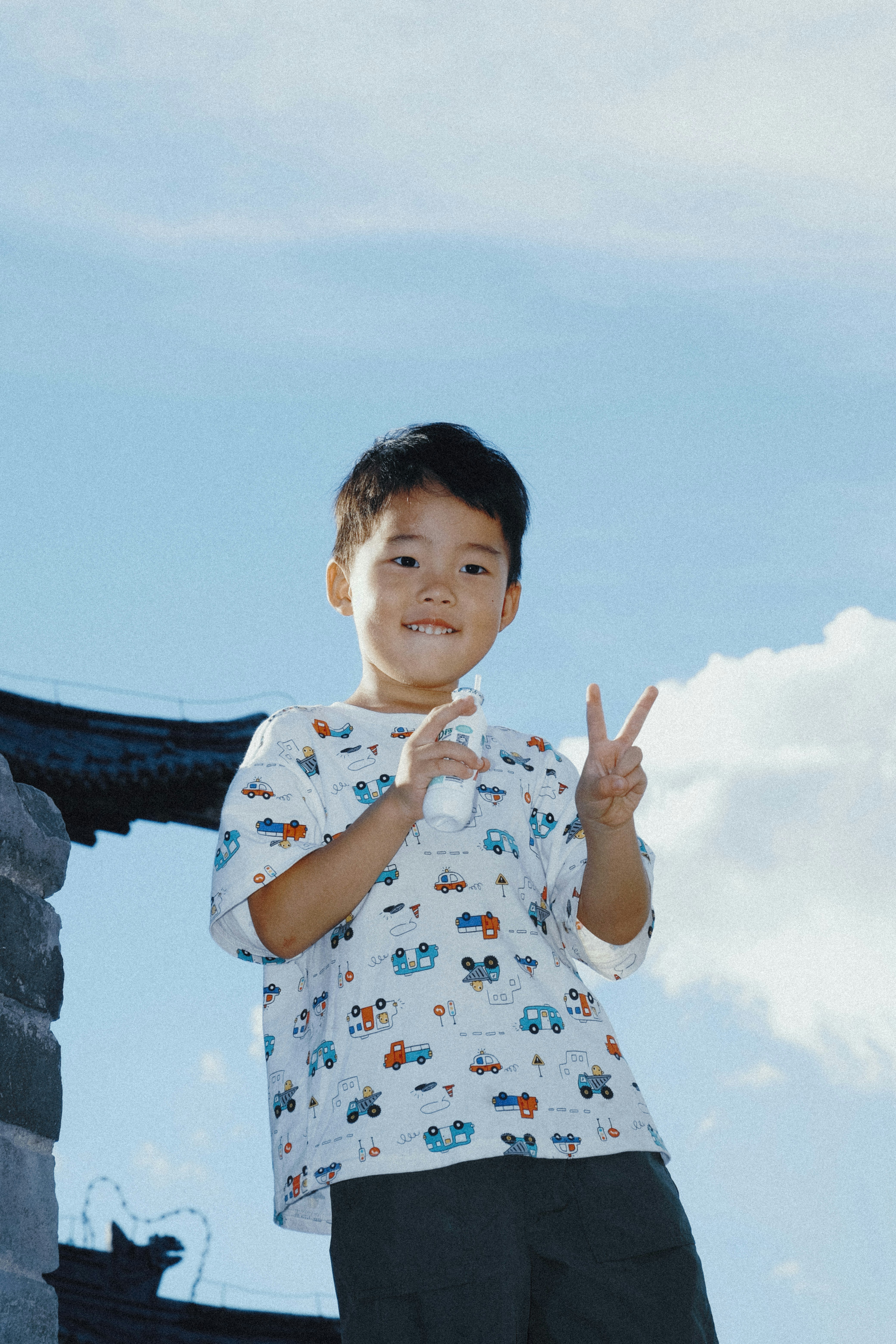 Joyful Gesture Under Open Sky