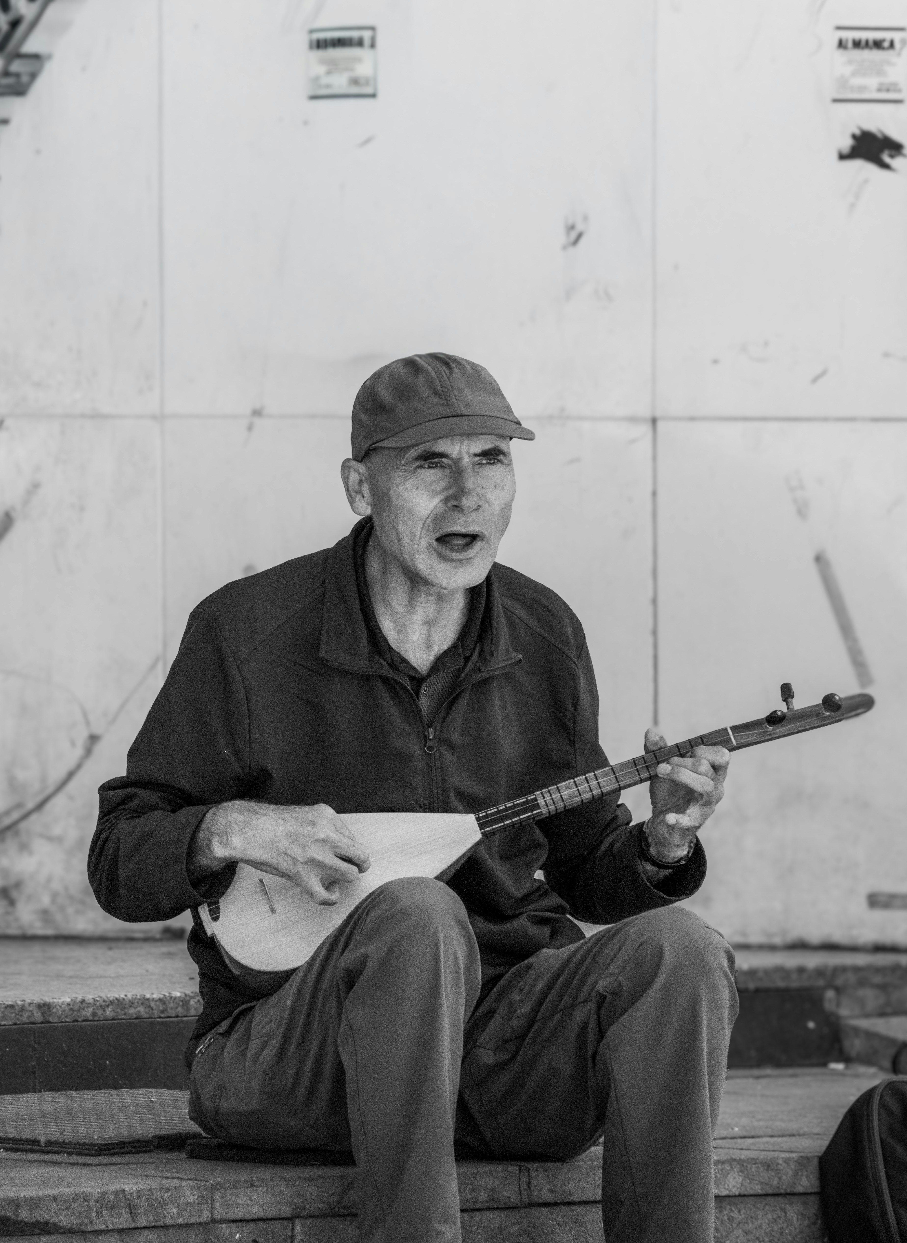Harmonics on the Steps: A Street Musician’s Quiet Stride