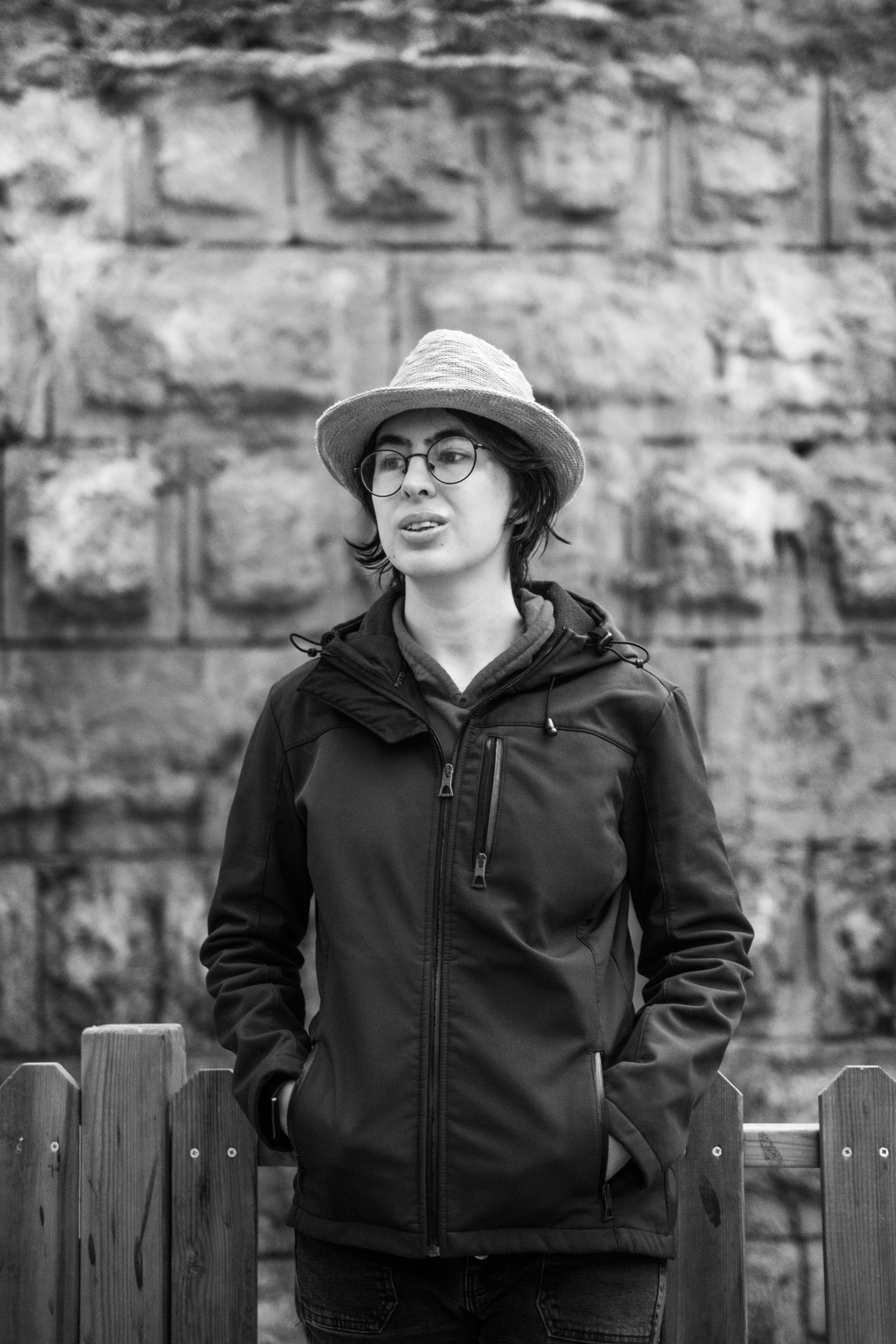 Heritage in Focus: A Casual Portrait by the Wall