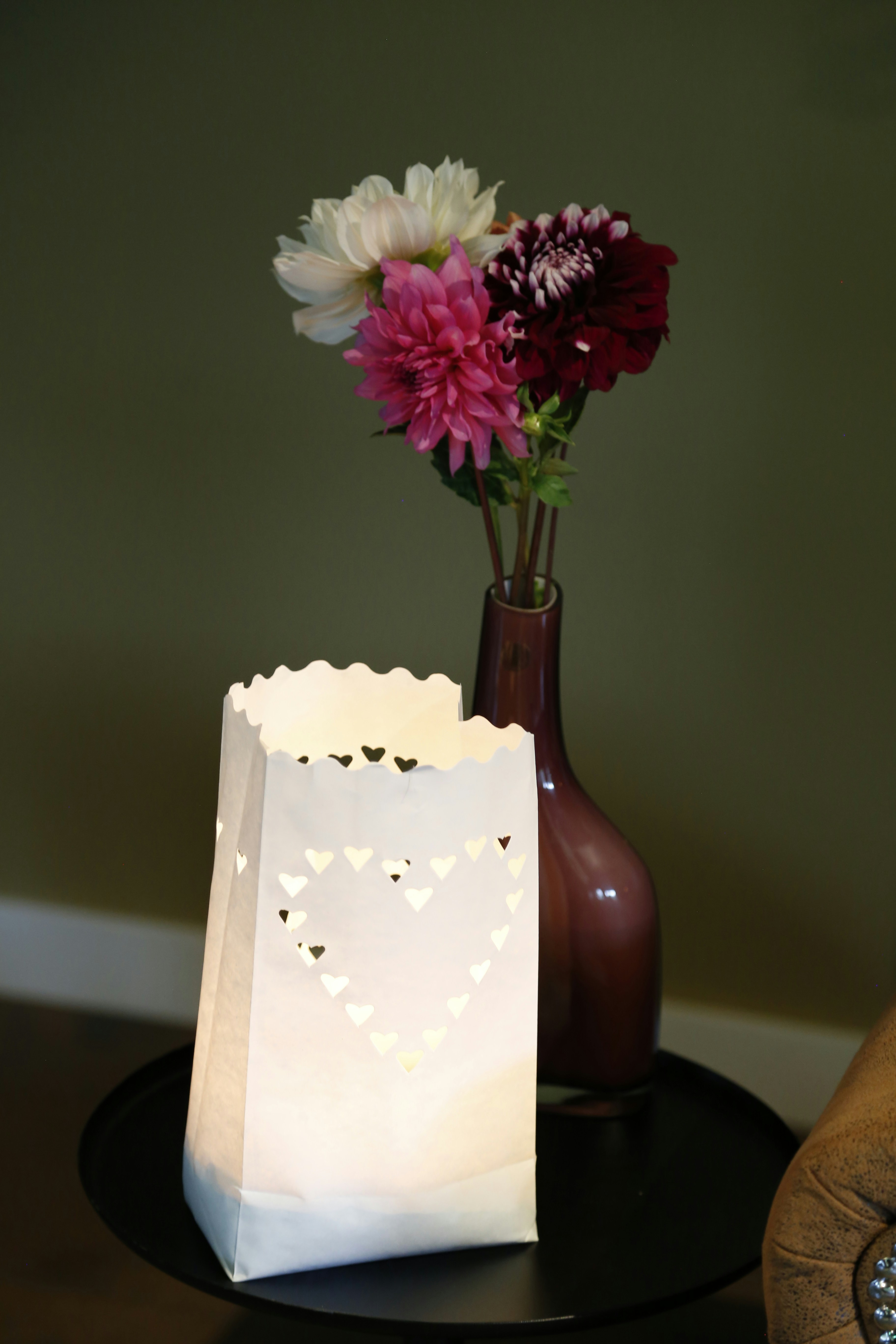 Petals and Paper: A Quiet Still Life with Floral Elegance