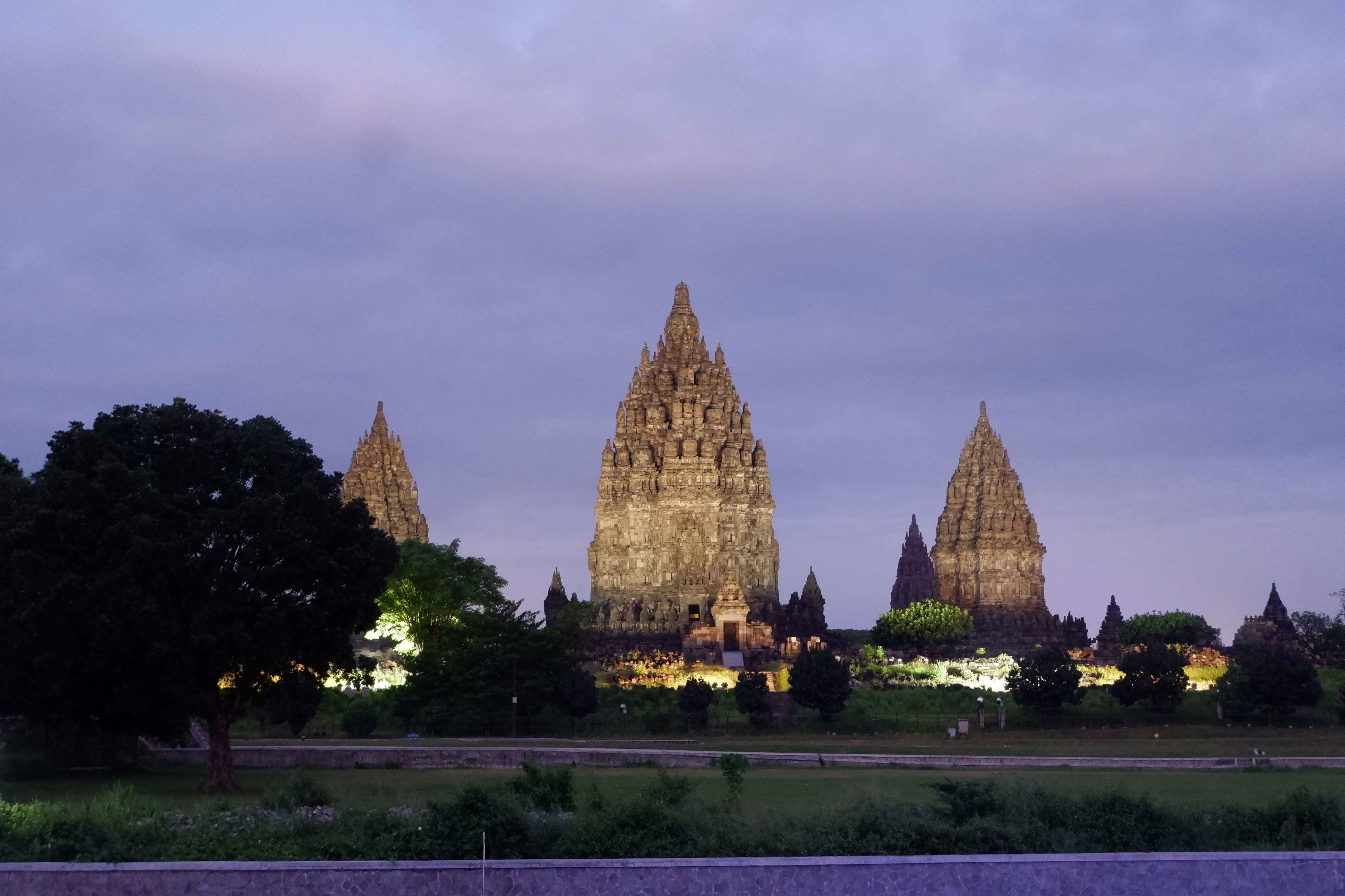 Temple Towers at Dusk: Gilded Peaks Amid Twilight Skies
