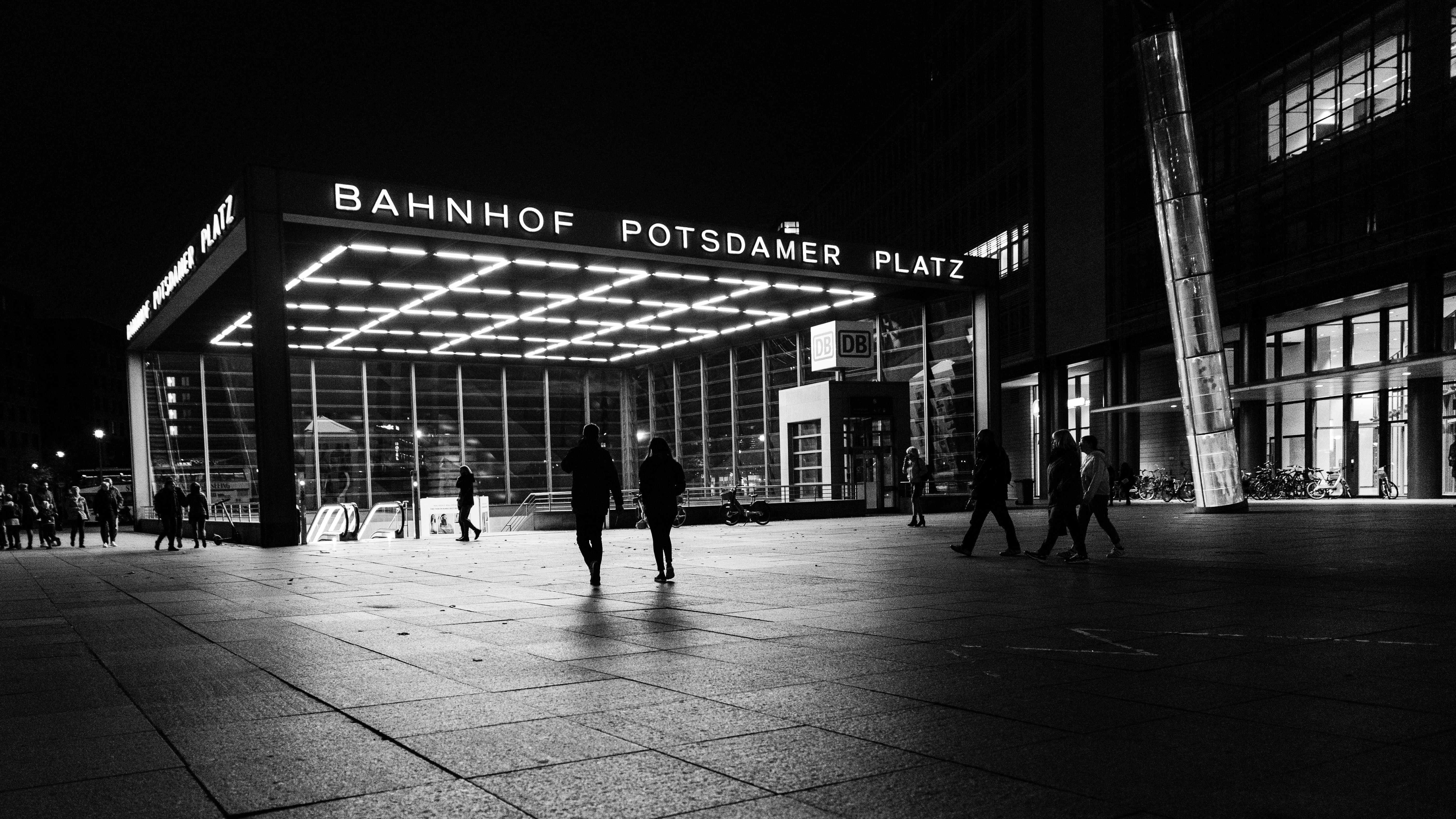 Night at Potsdamer Platz: Quiet Walk Through a Neoned Facade