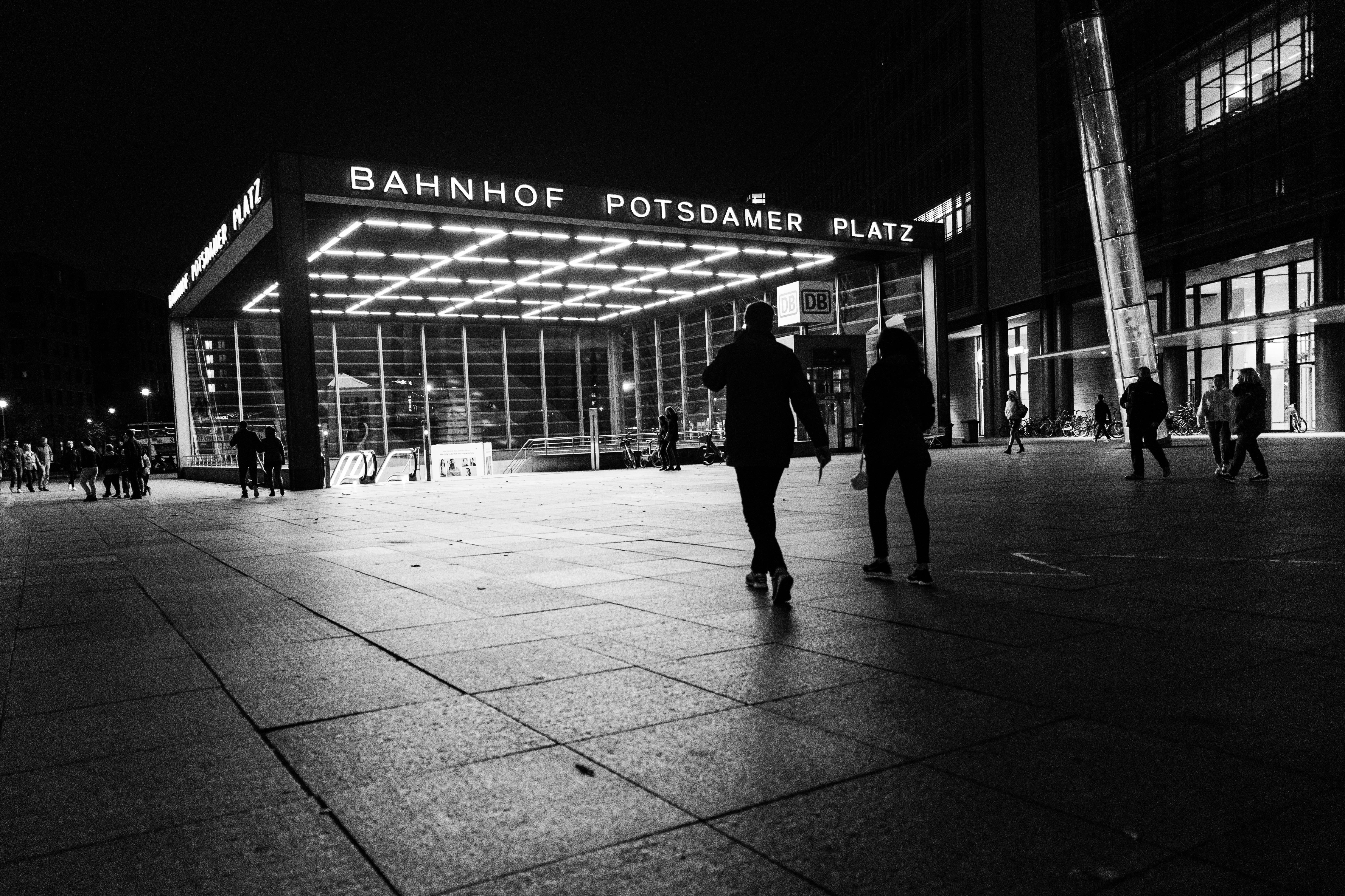 Night at Potsdamer Platz: Silent Expectation Beyond the Facade