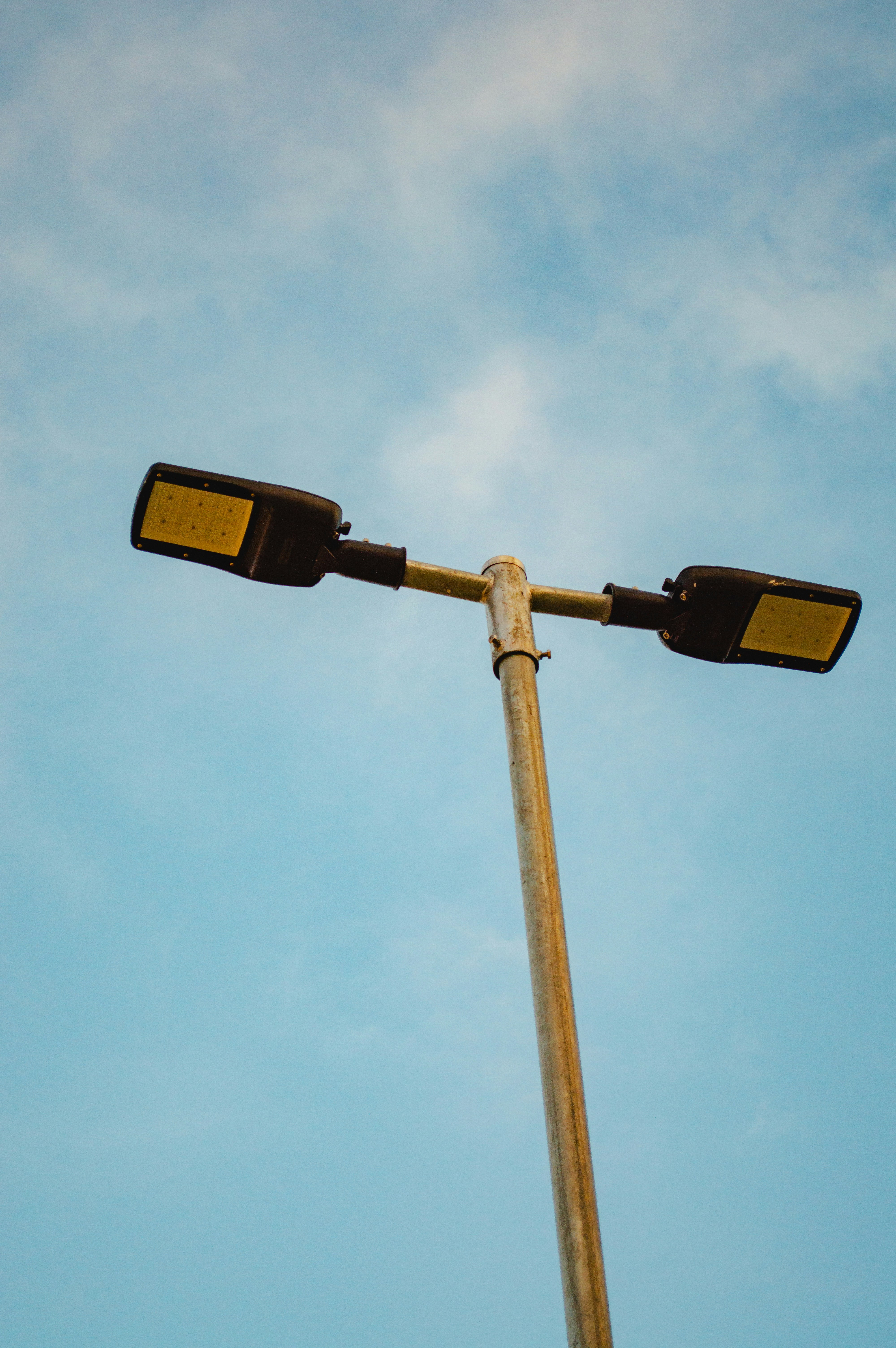 Pole-Top Lights Against a Clear Sky