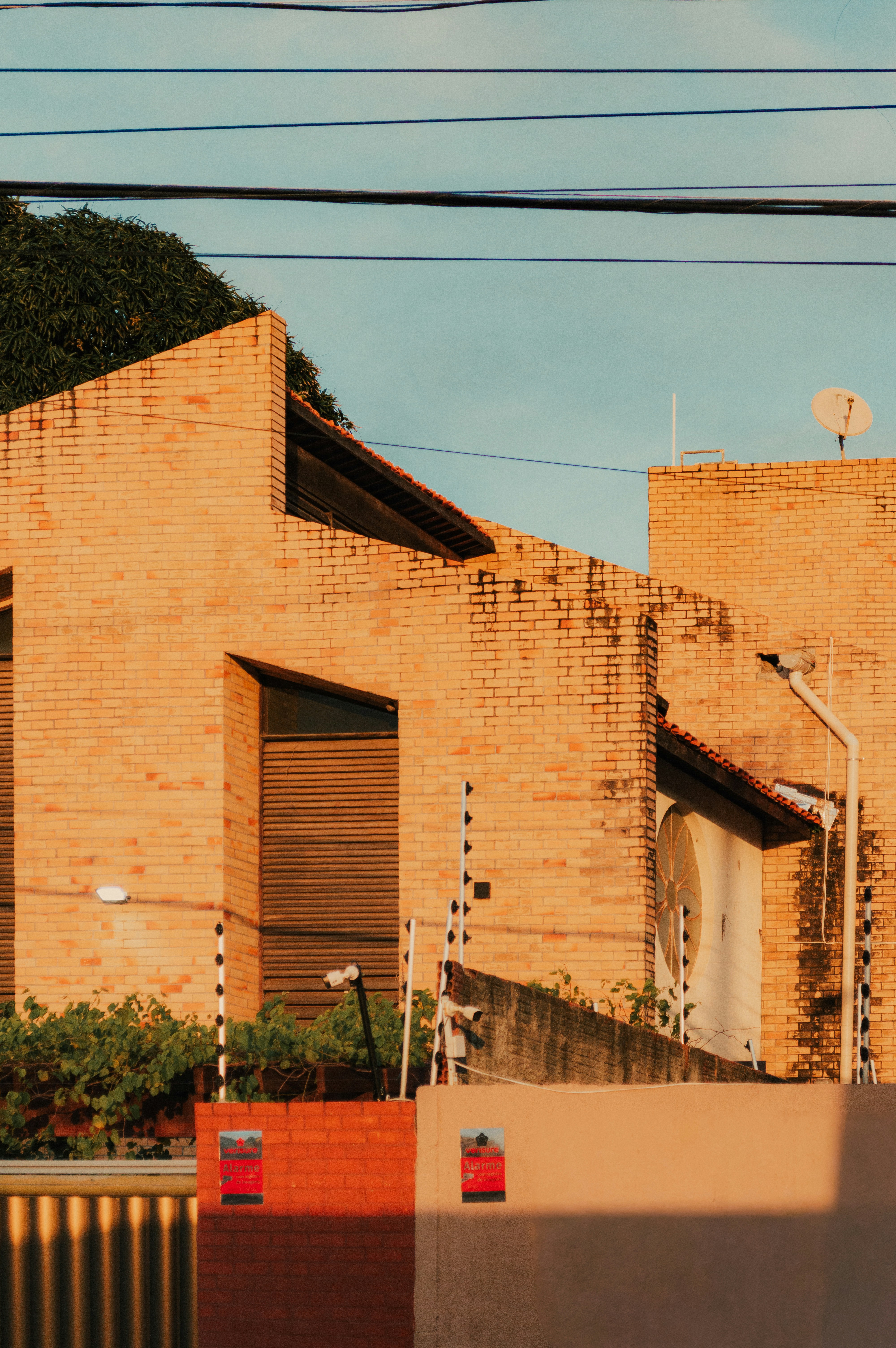 Sunlit Brickwork Under a Quiet Sky