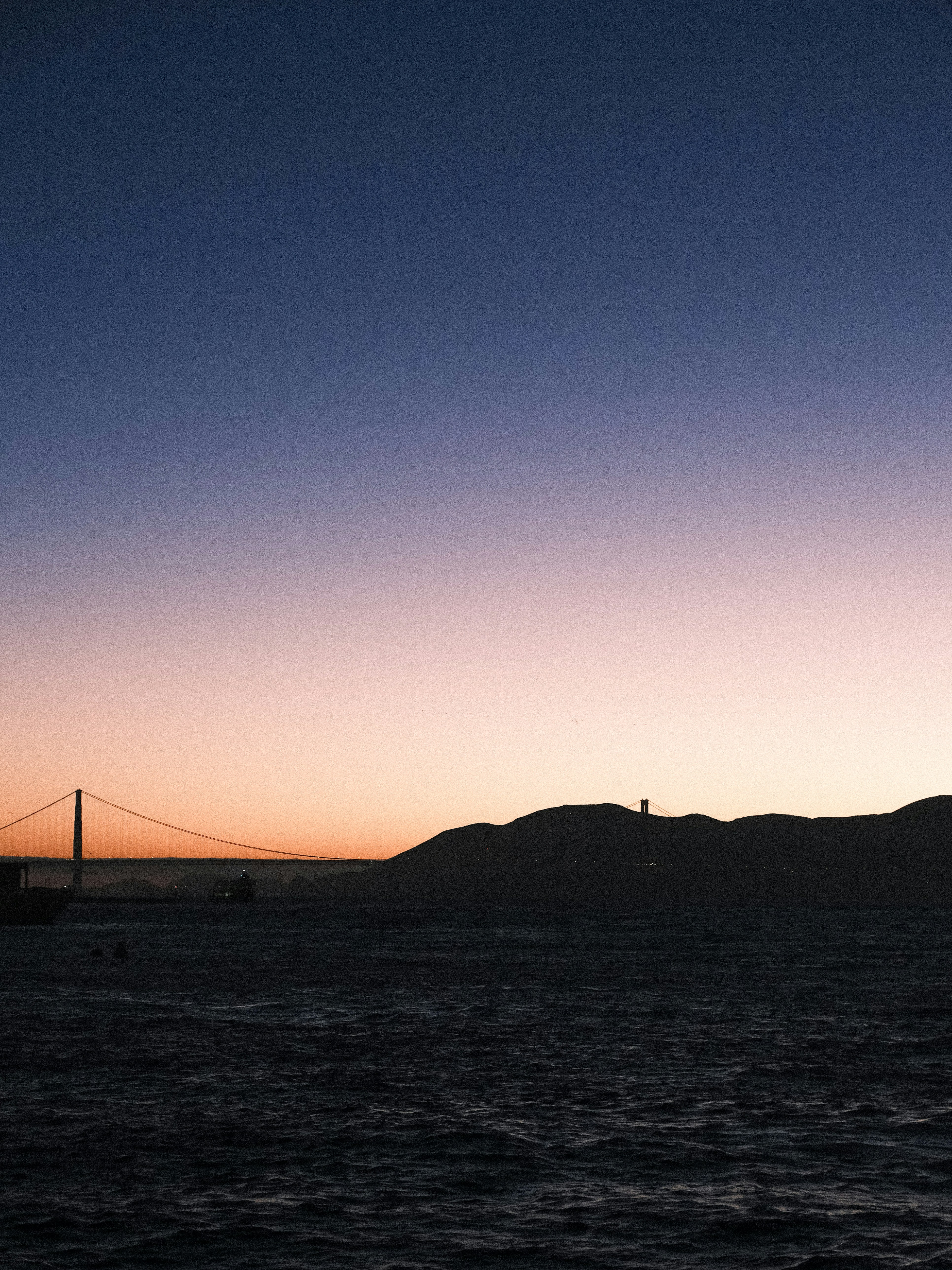 Dusk Over the Bay: Silent Suspension Bridge