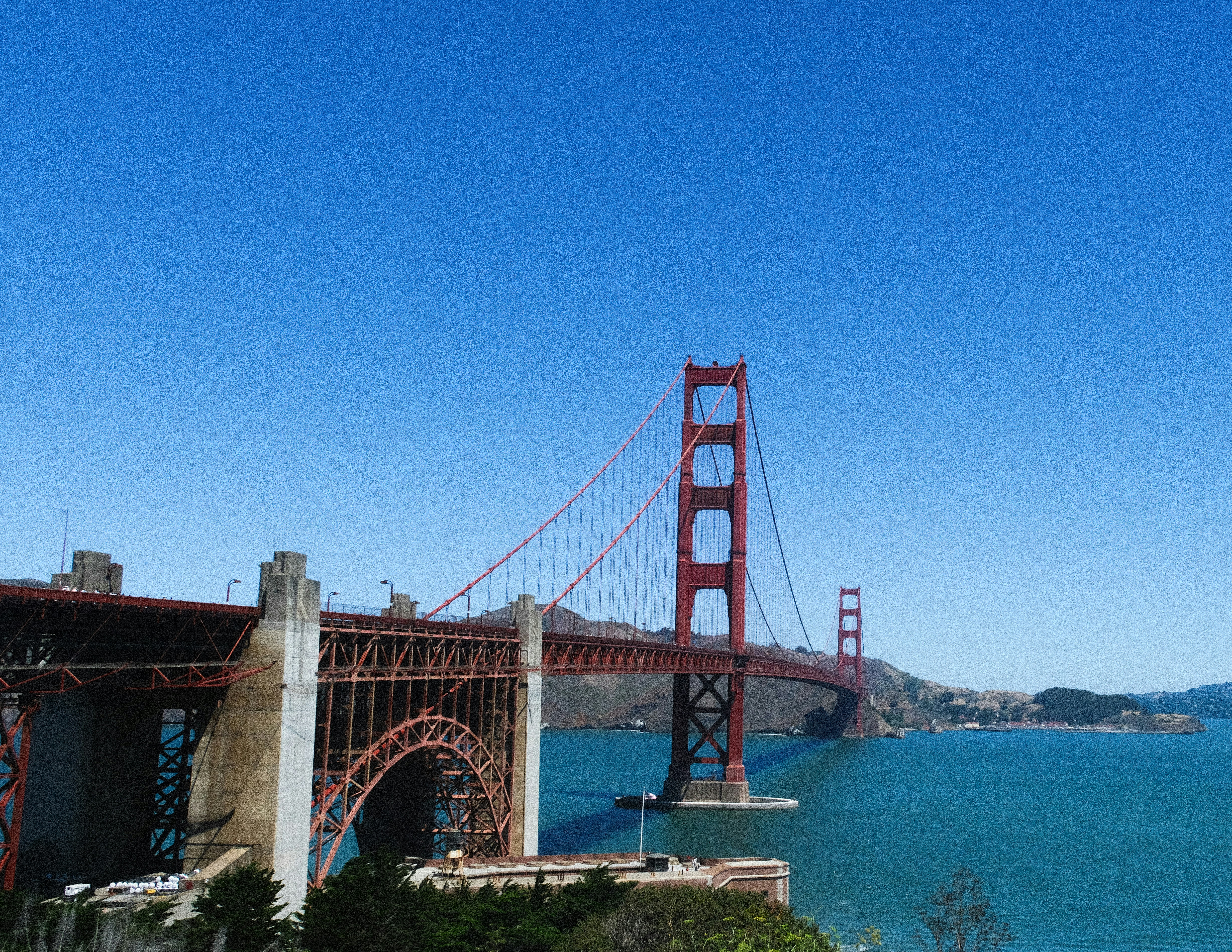 Red Span Over Water: The Golden Gate in Clear Light