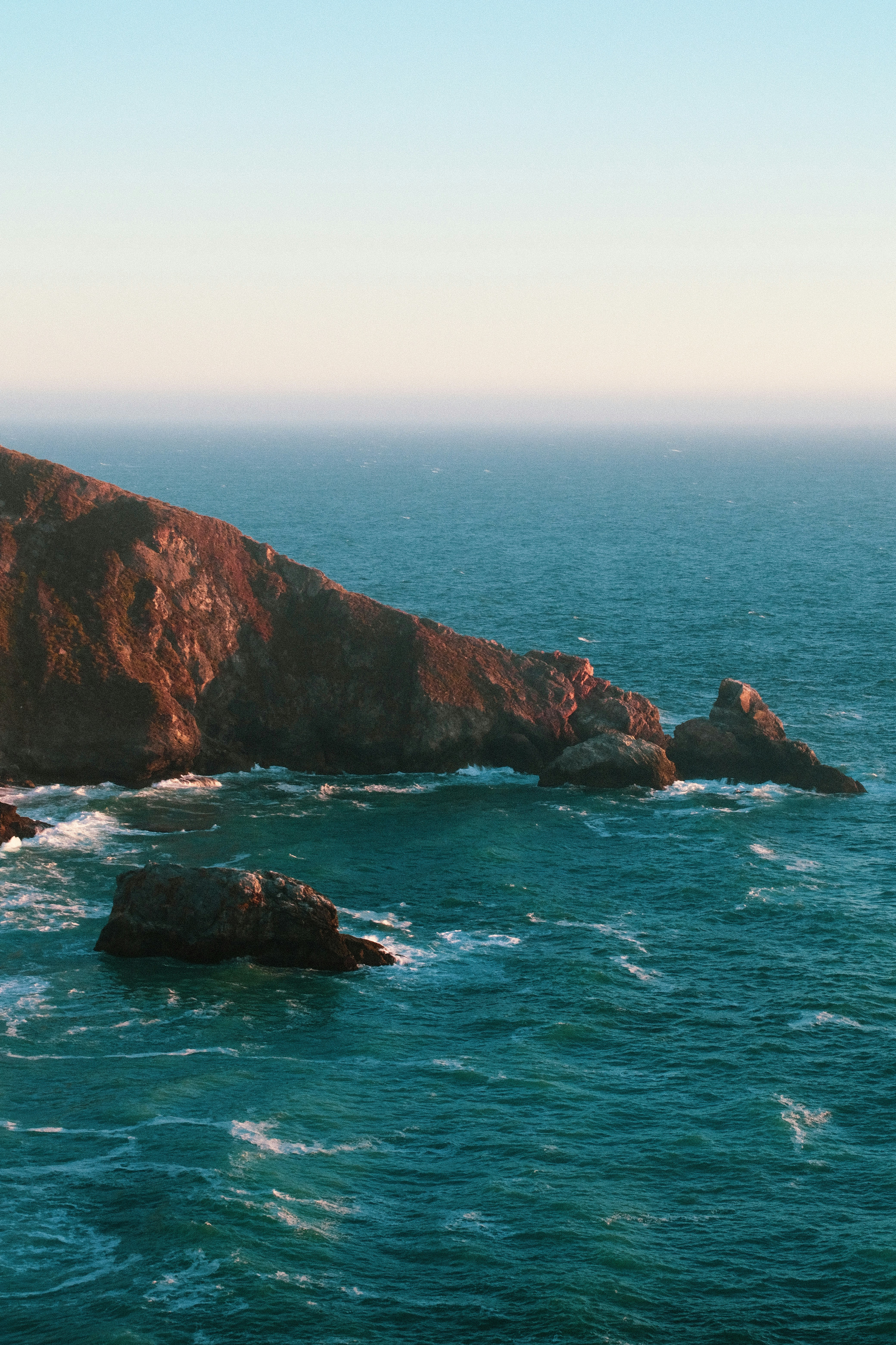 Golden Hour Cliffs Over a Calm Atlantic