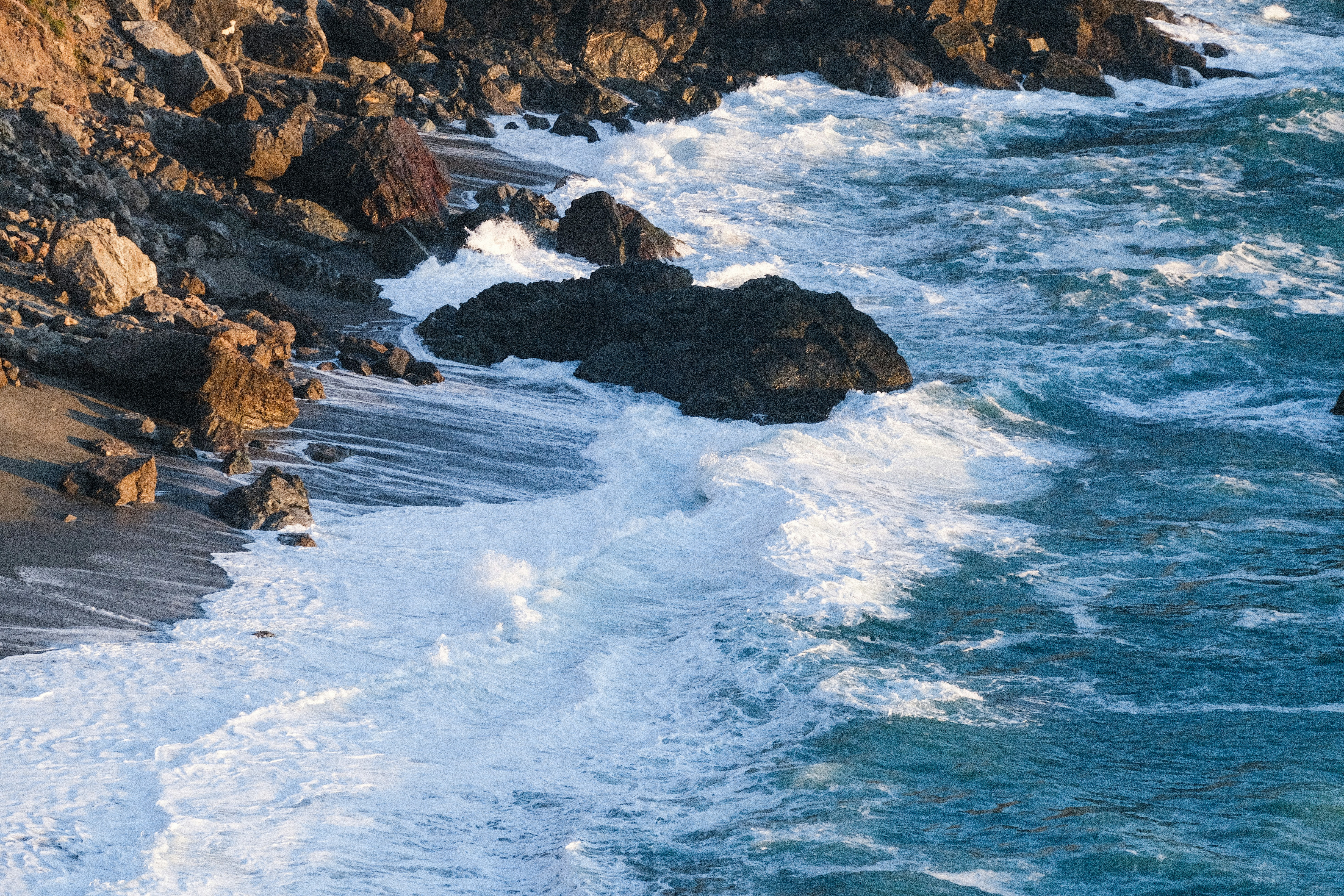 Rugged Coasts: Waves Conquer The Shattered Rocks