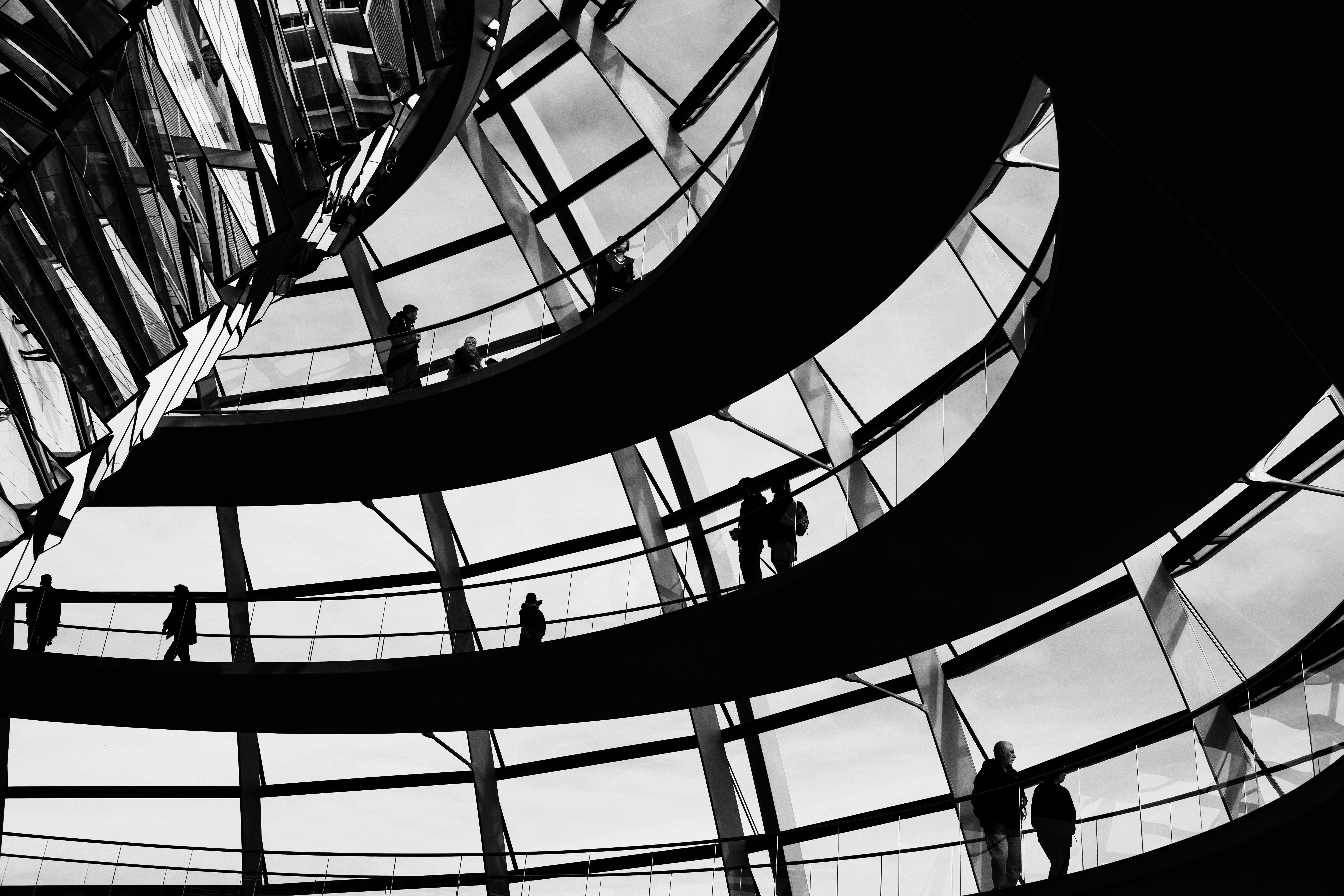 Spiral Atrium: Silhouettes on Curved Steel Ribbons