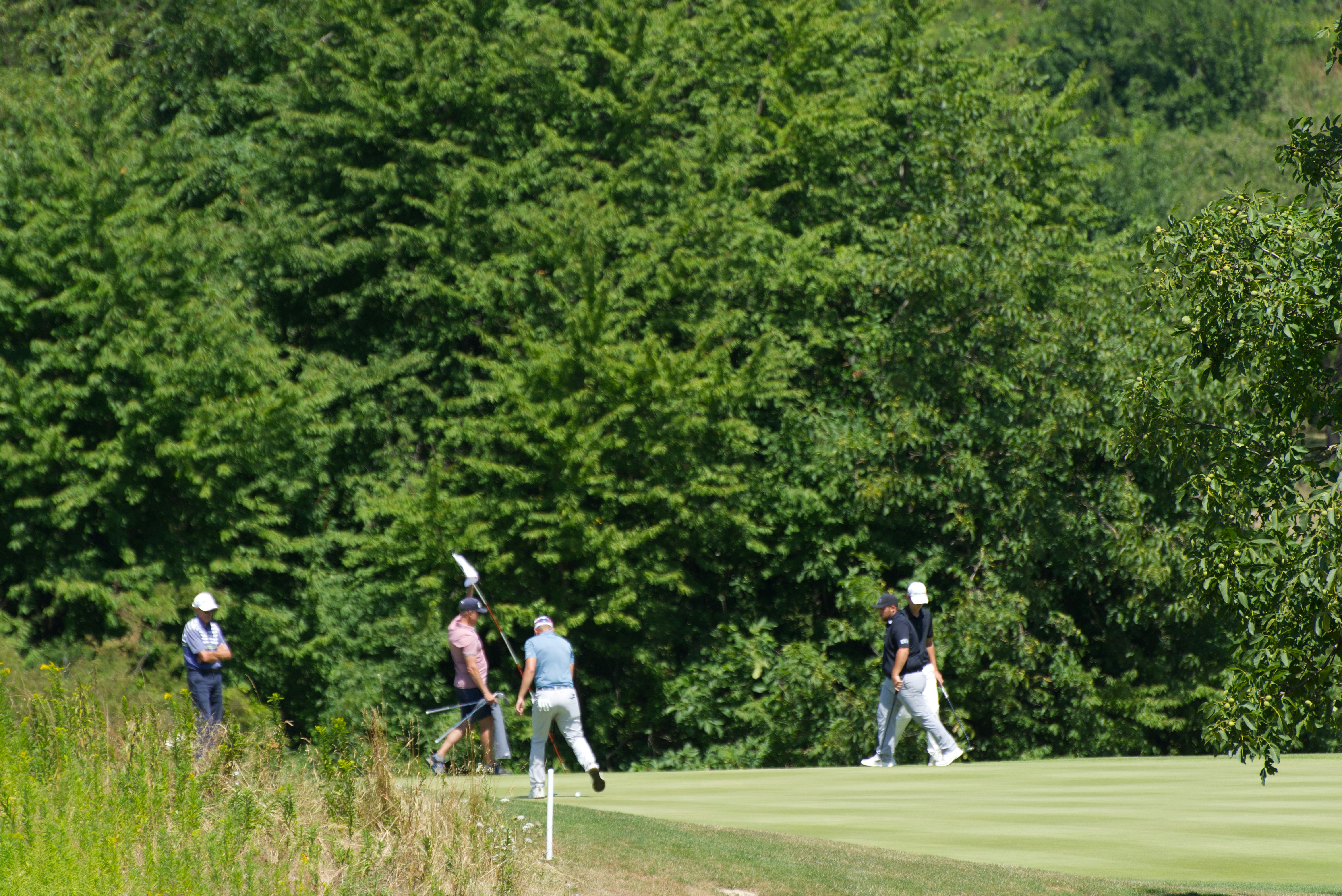 Golf Cart Crew Crossing: A Brief Moment on the Greens