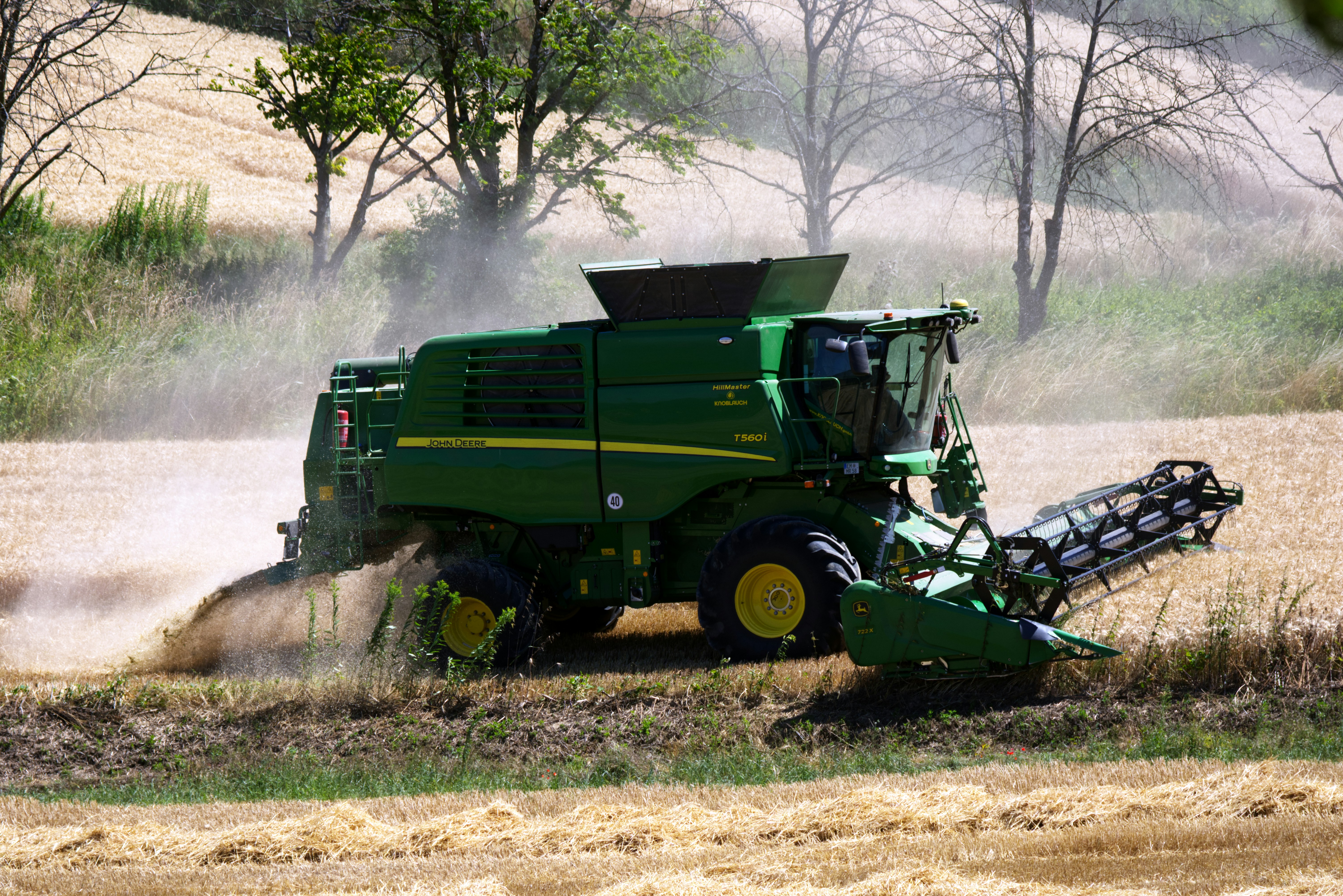 Green Harvester in Dust: A Fieldwork Moment