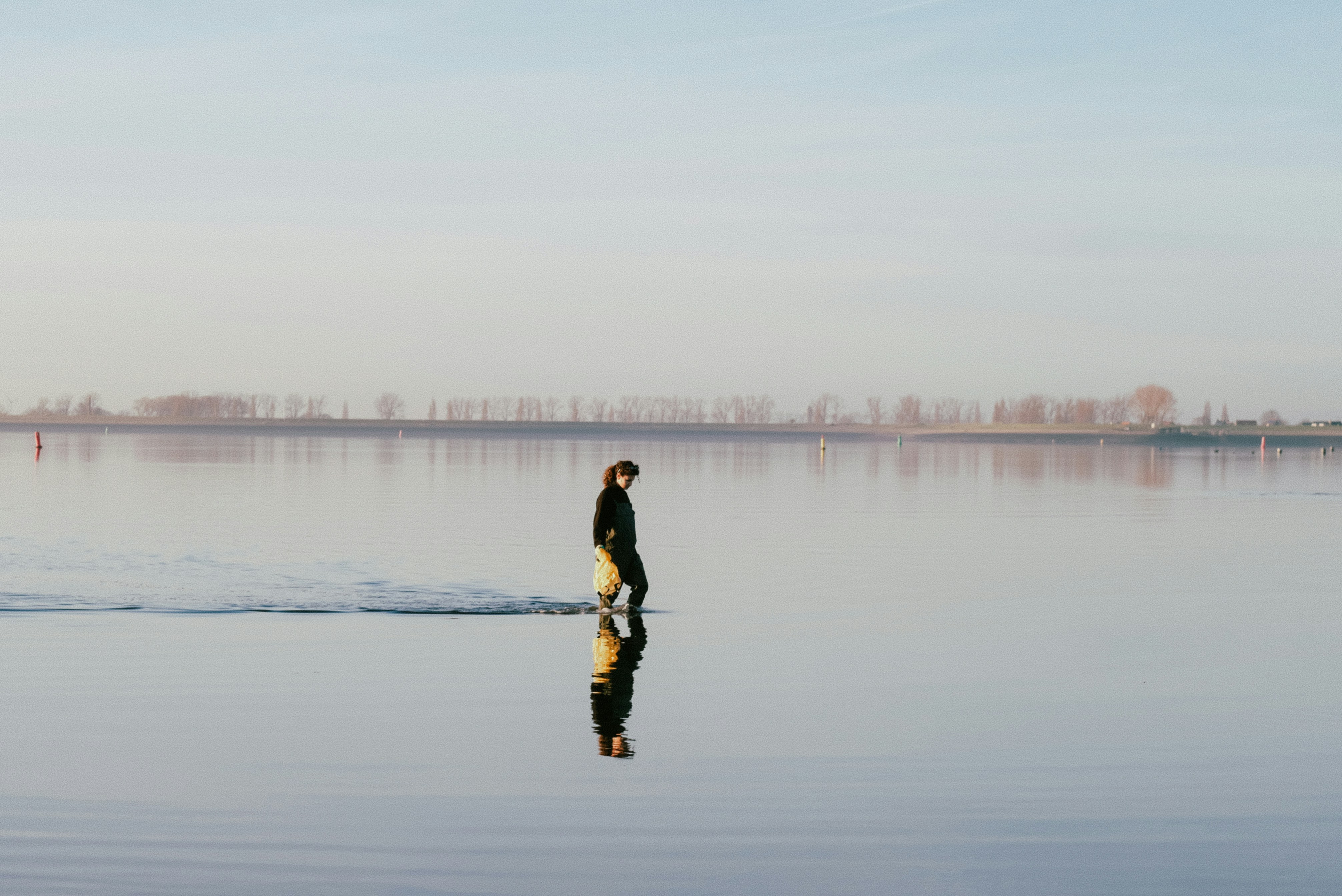 Solitary Wanderer Across a Glassy Expanse