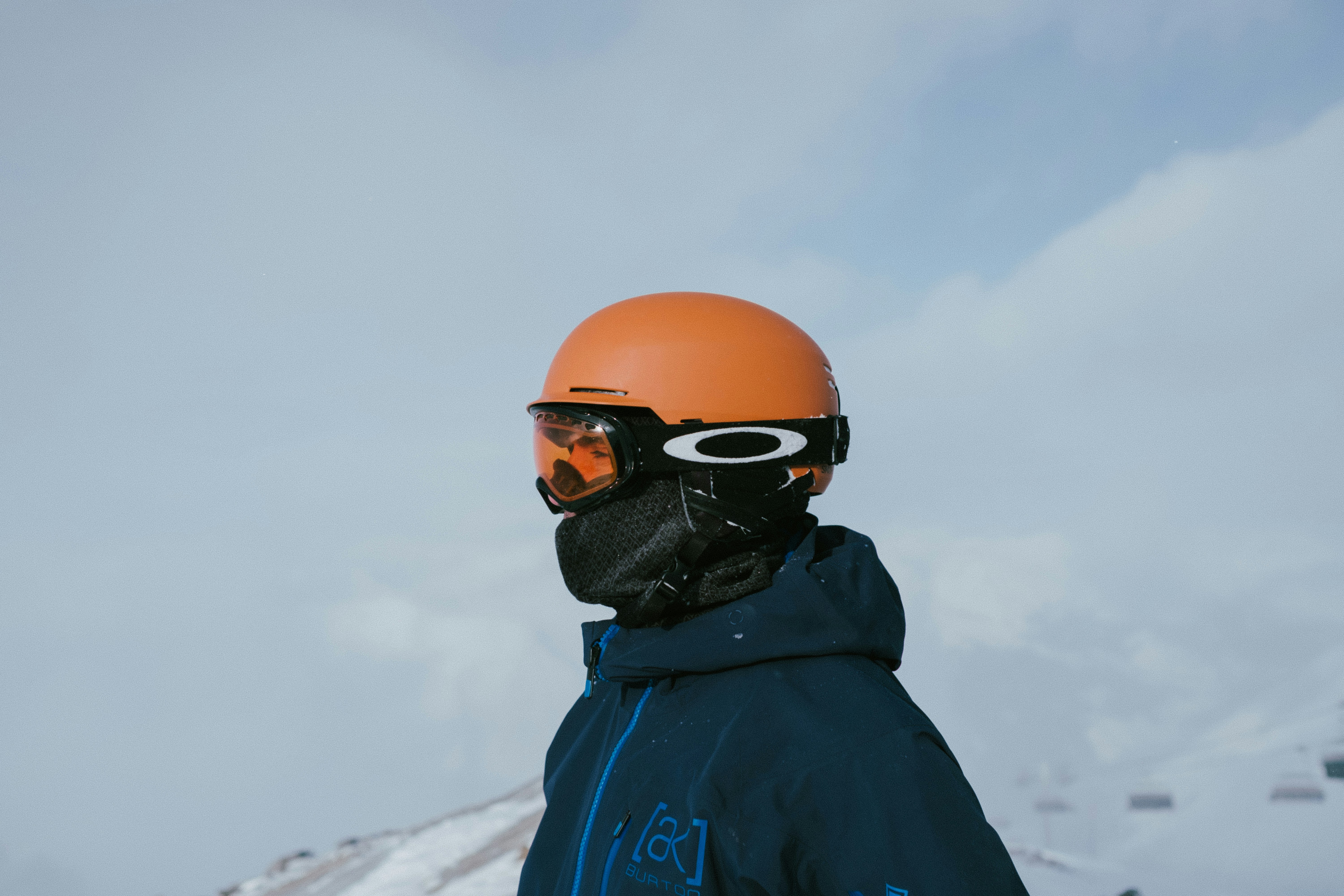 Orange-Helmeted Explorer at Snowy Horizon