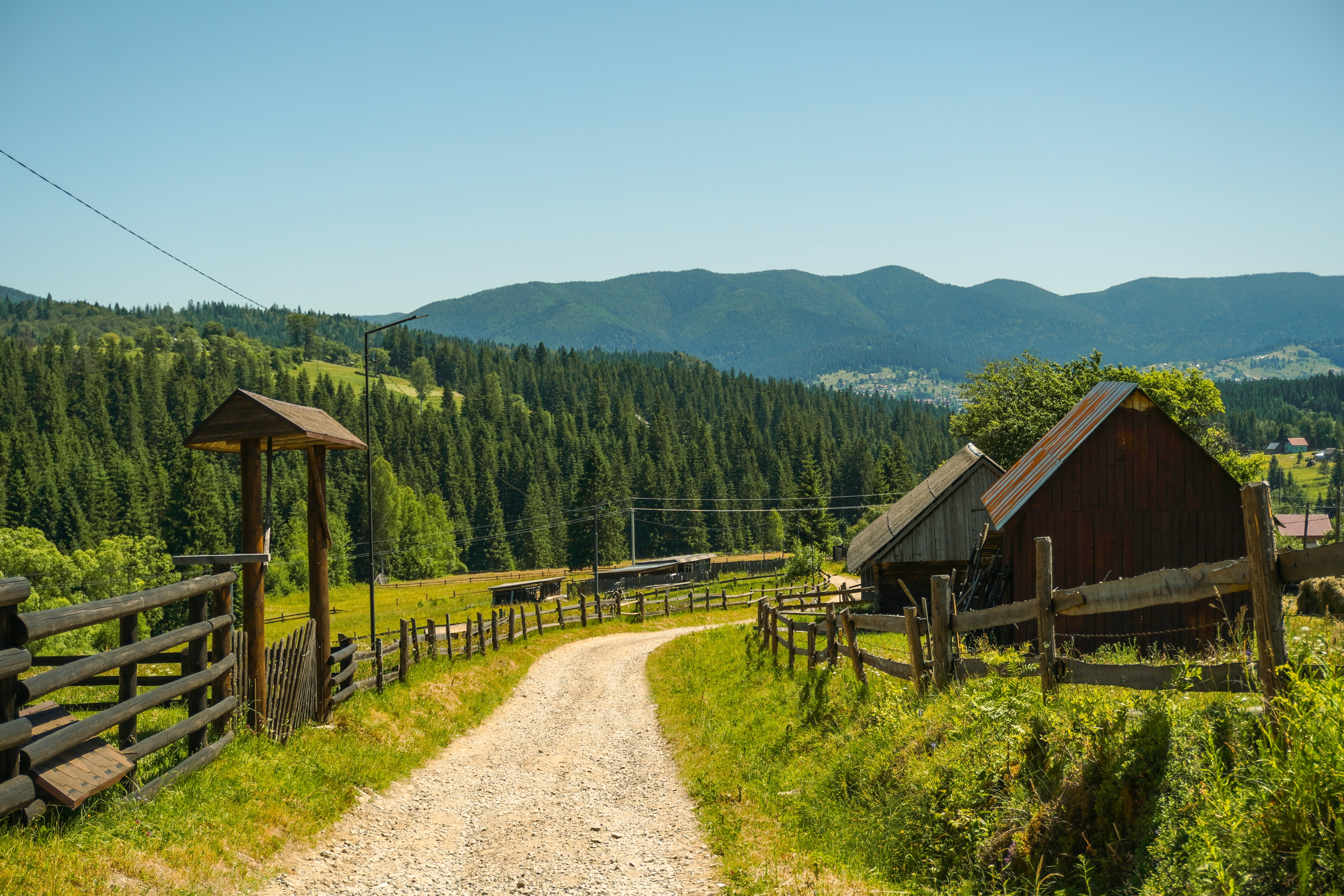 Dusty Rural Path Through a Verdant Valley
