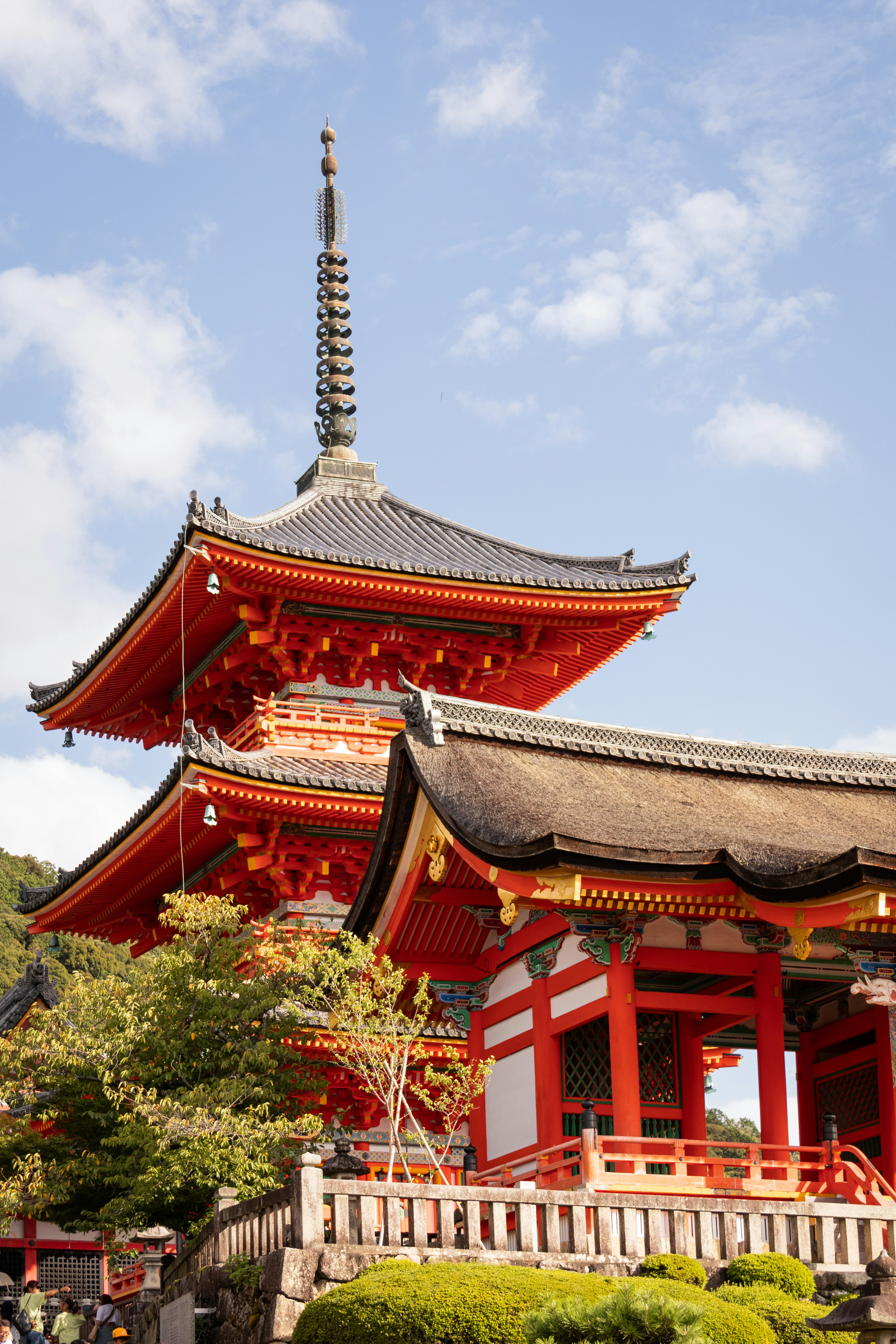Red Pagoda Dawn: A Sacred Colonnade Rising Above Garden Stone