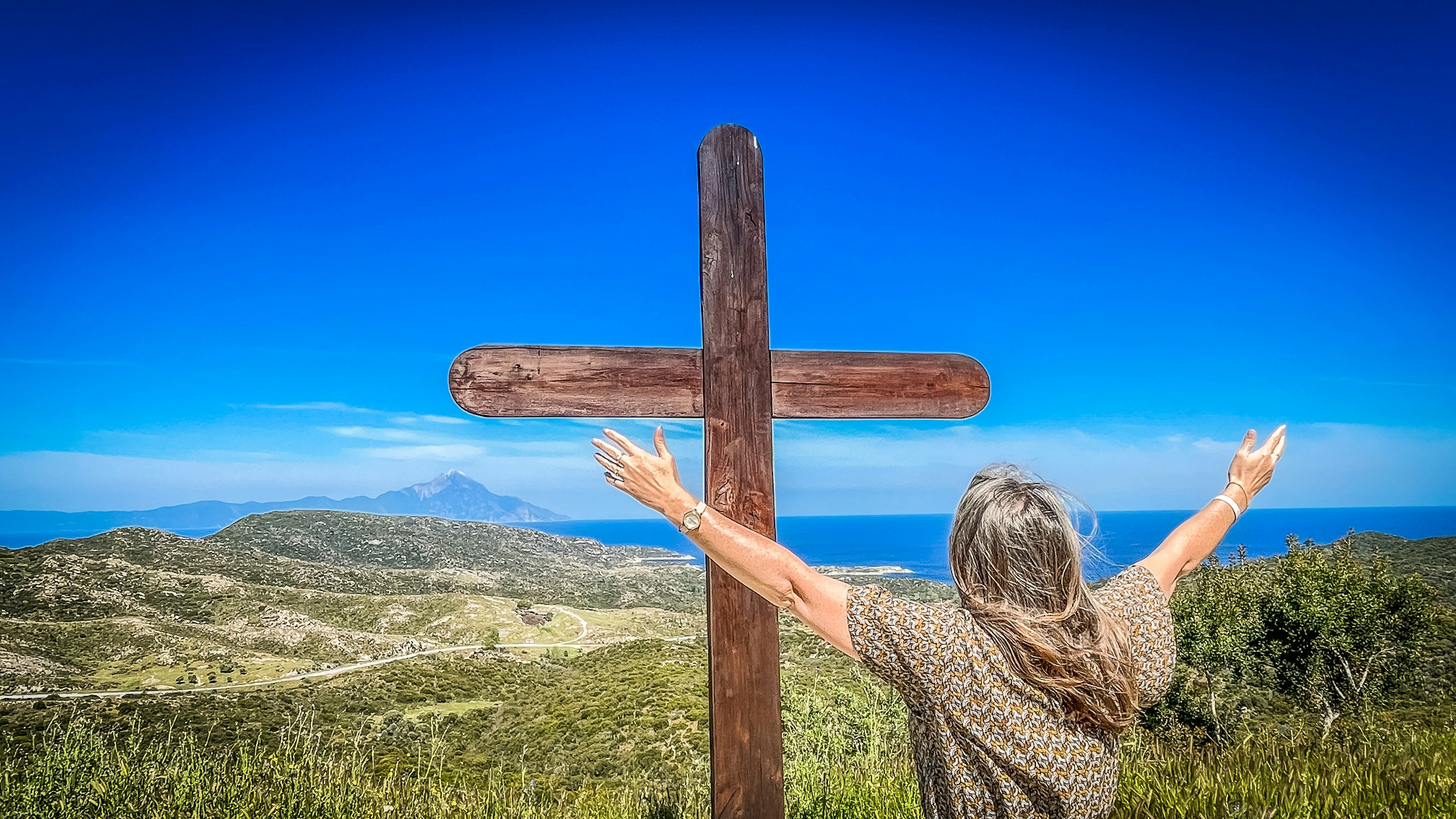 Arms Wide to the Horizon: A Pilgrim’s Pause by the Cross