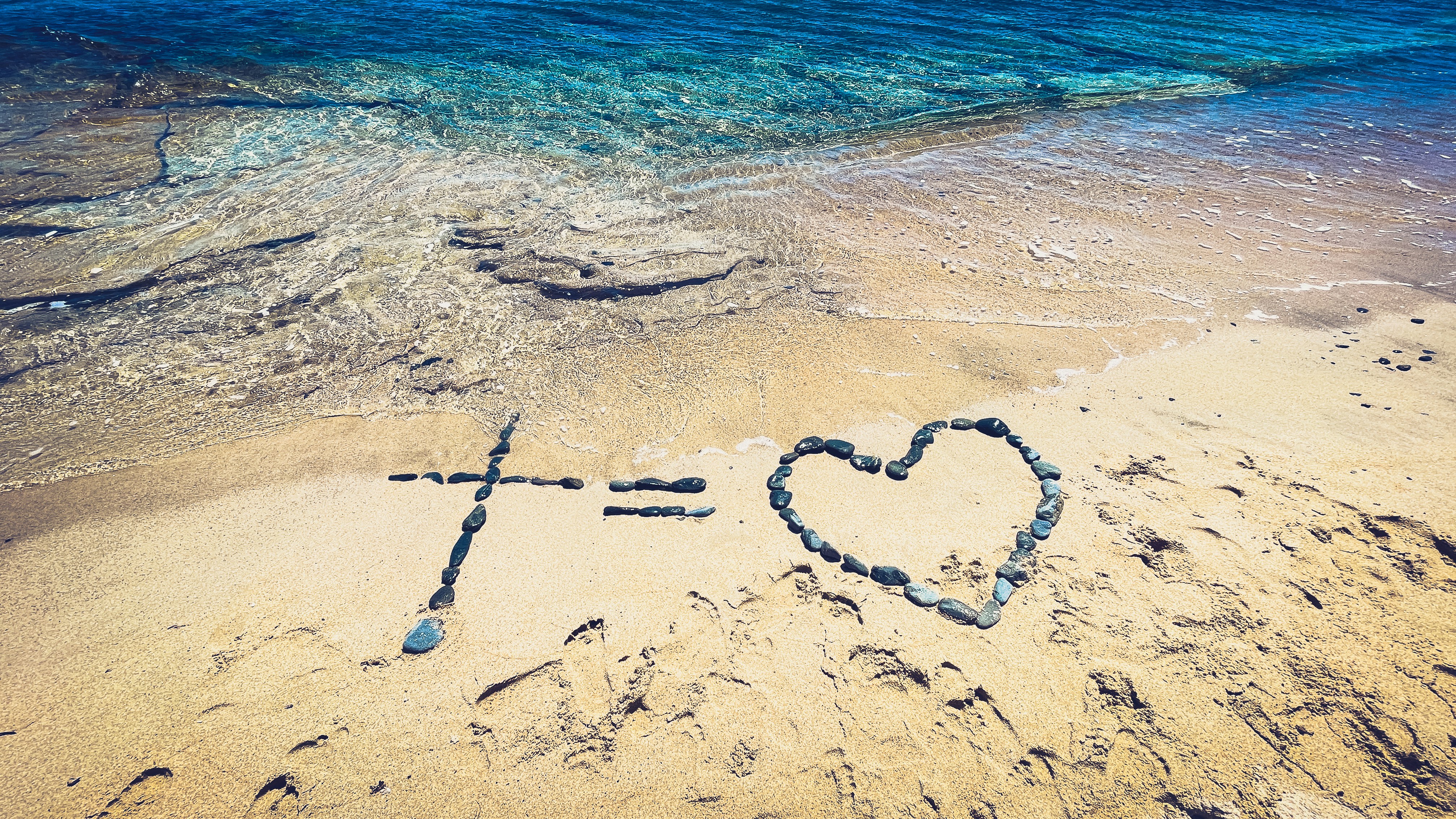 Heartfelt Beach Message in the Gentle Tide