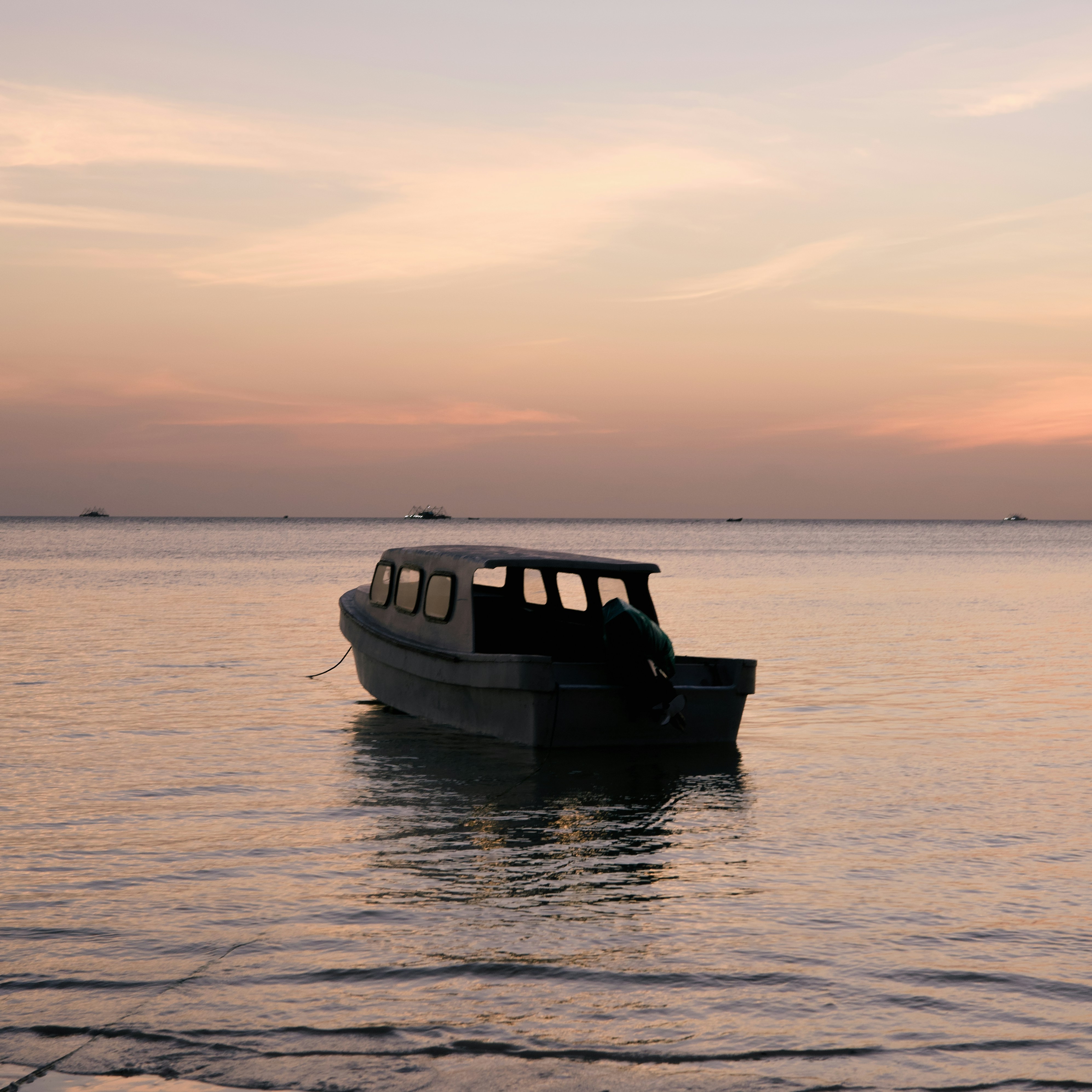 Dawn Vessel on Quiet Waters
