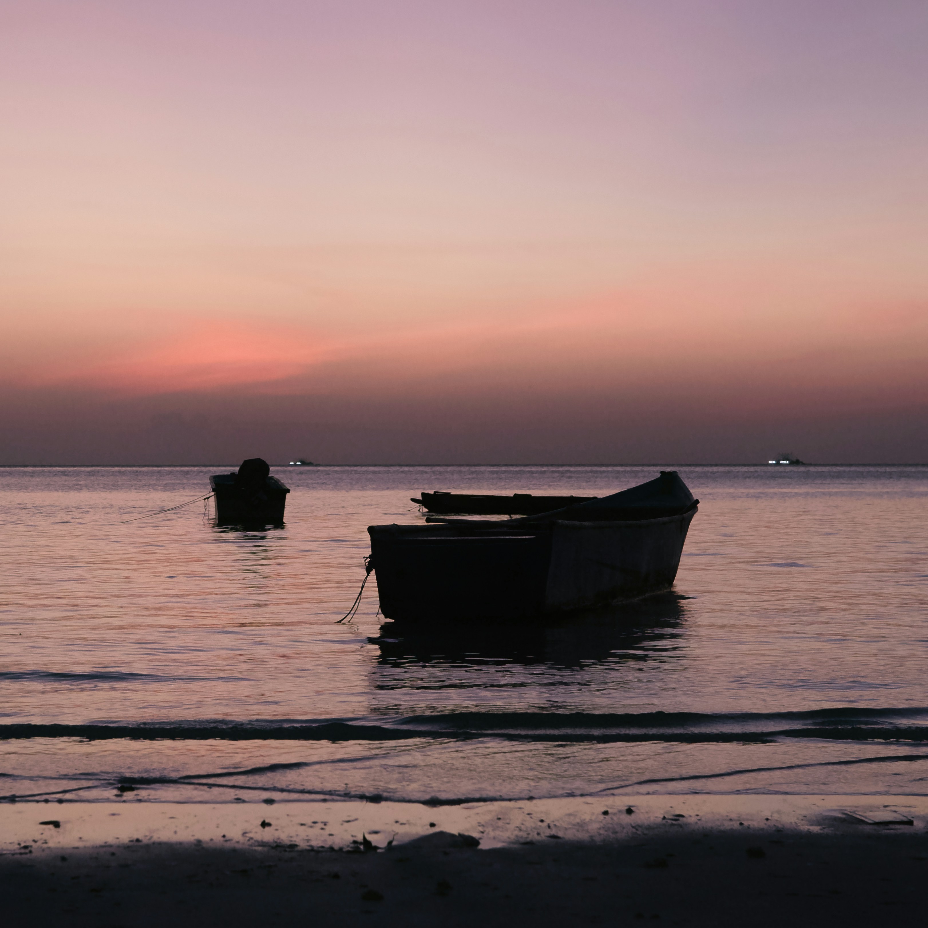 Twilight at the Quiet Harbor: Boats at Rest on Gentle Waves