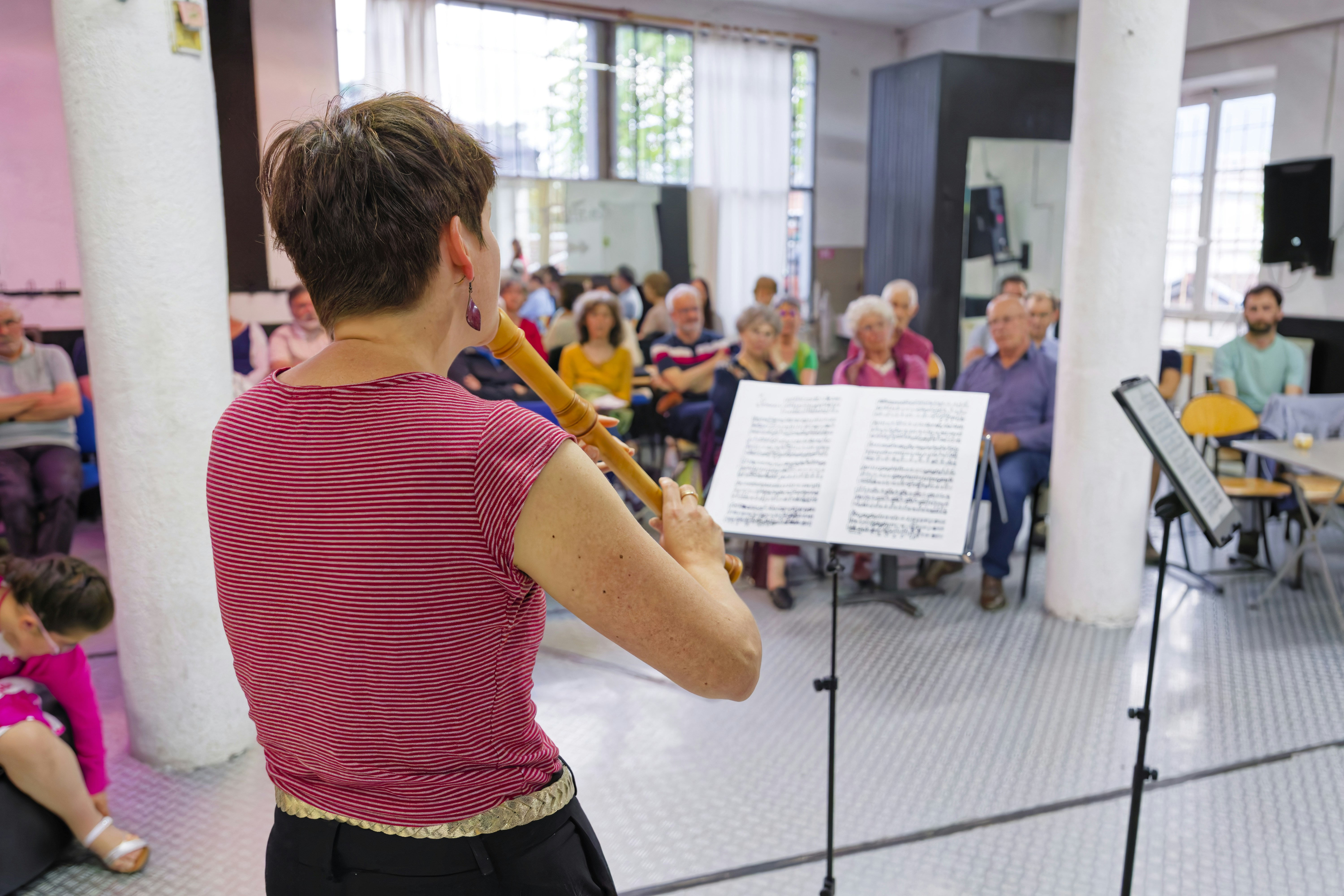 Flautist in Focus: A Community Concert in Motion