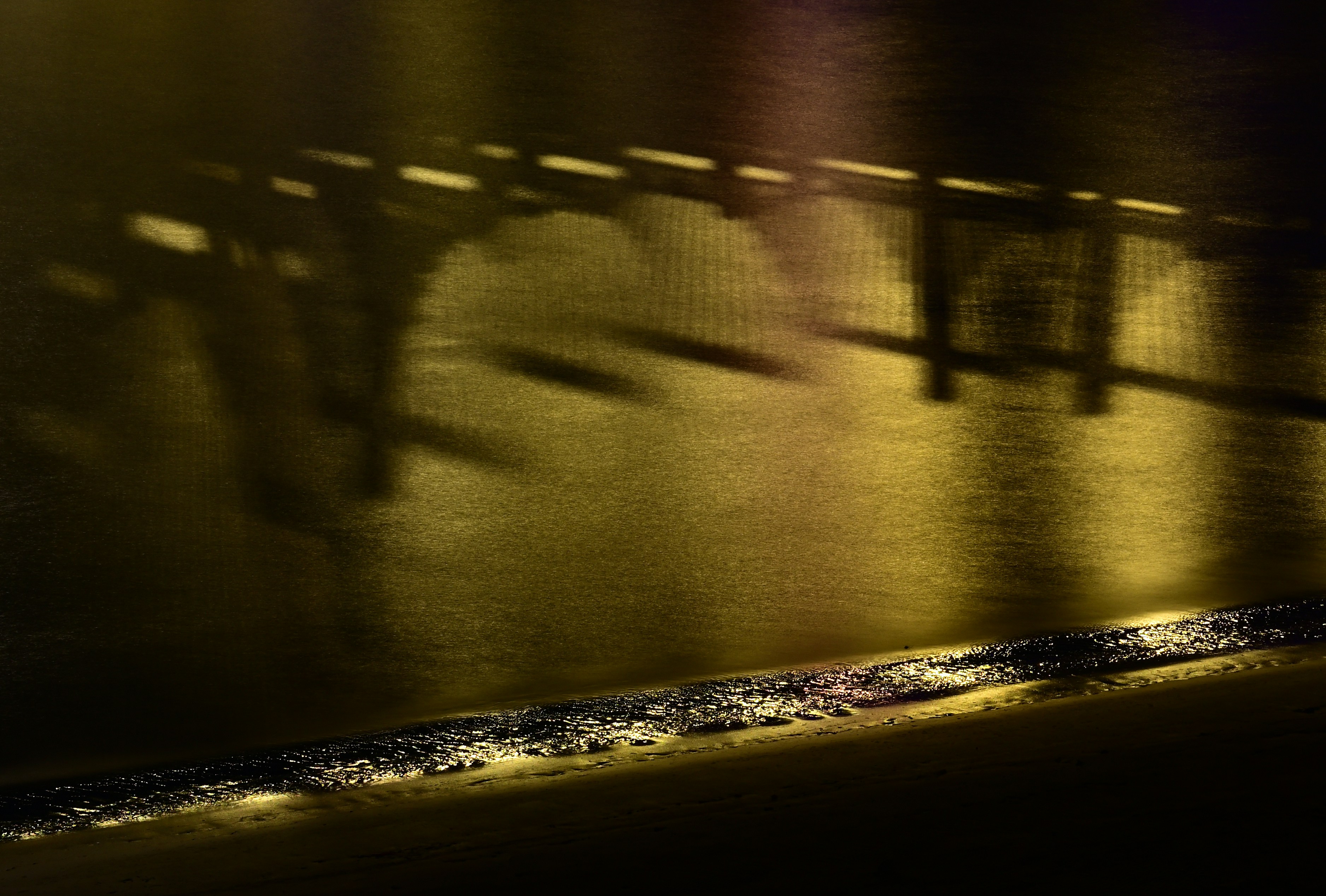 Low-Light Dockside Echoes under Railing Reflections