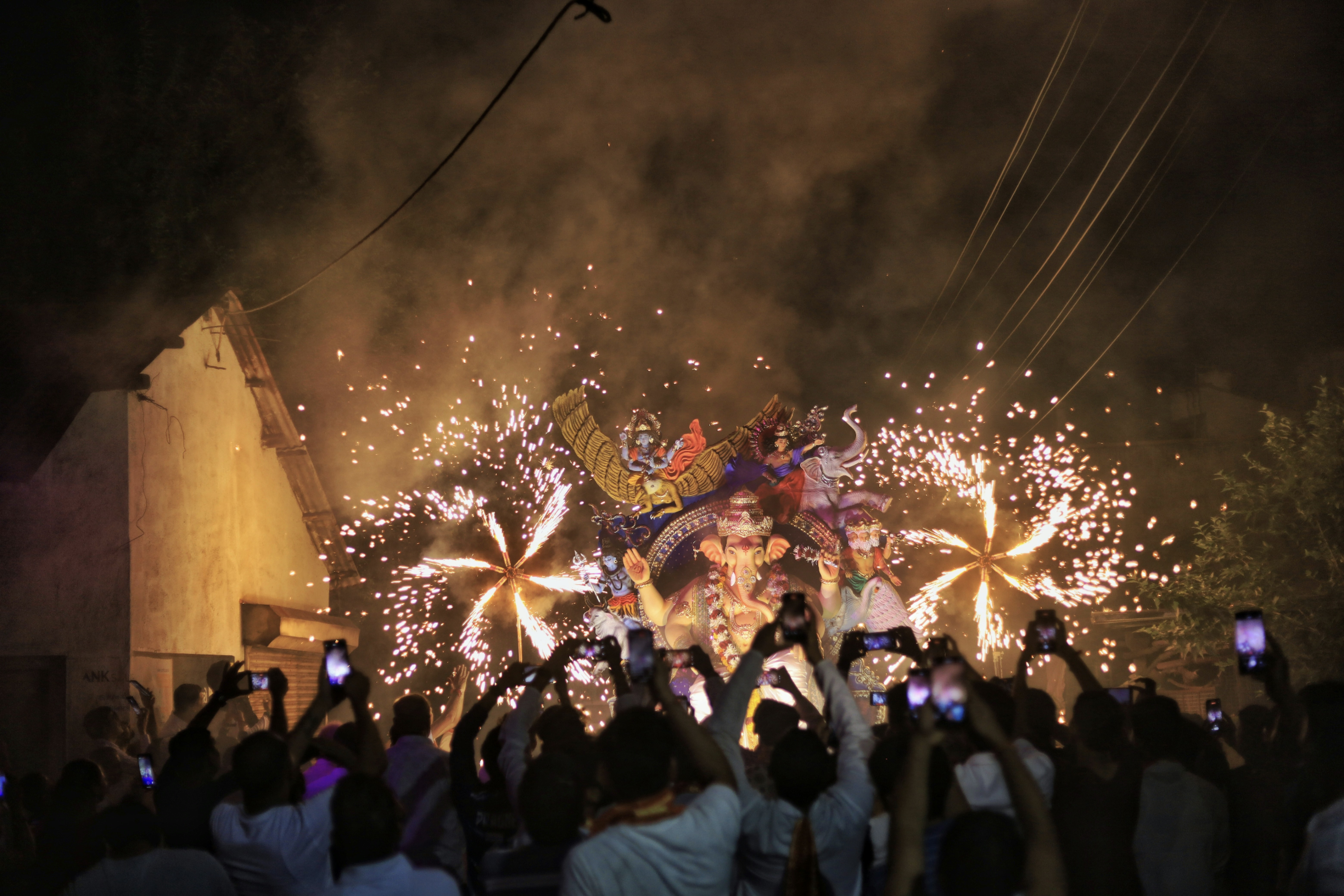 Fireworks and festival ritual: a masked procession erupts with sparks
