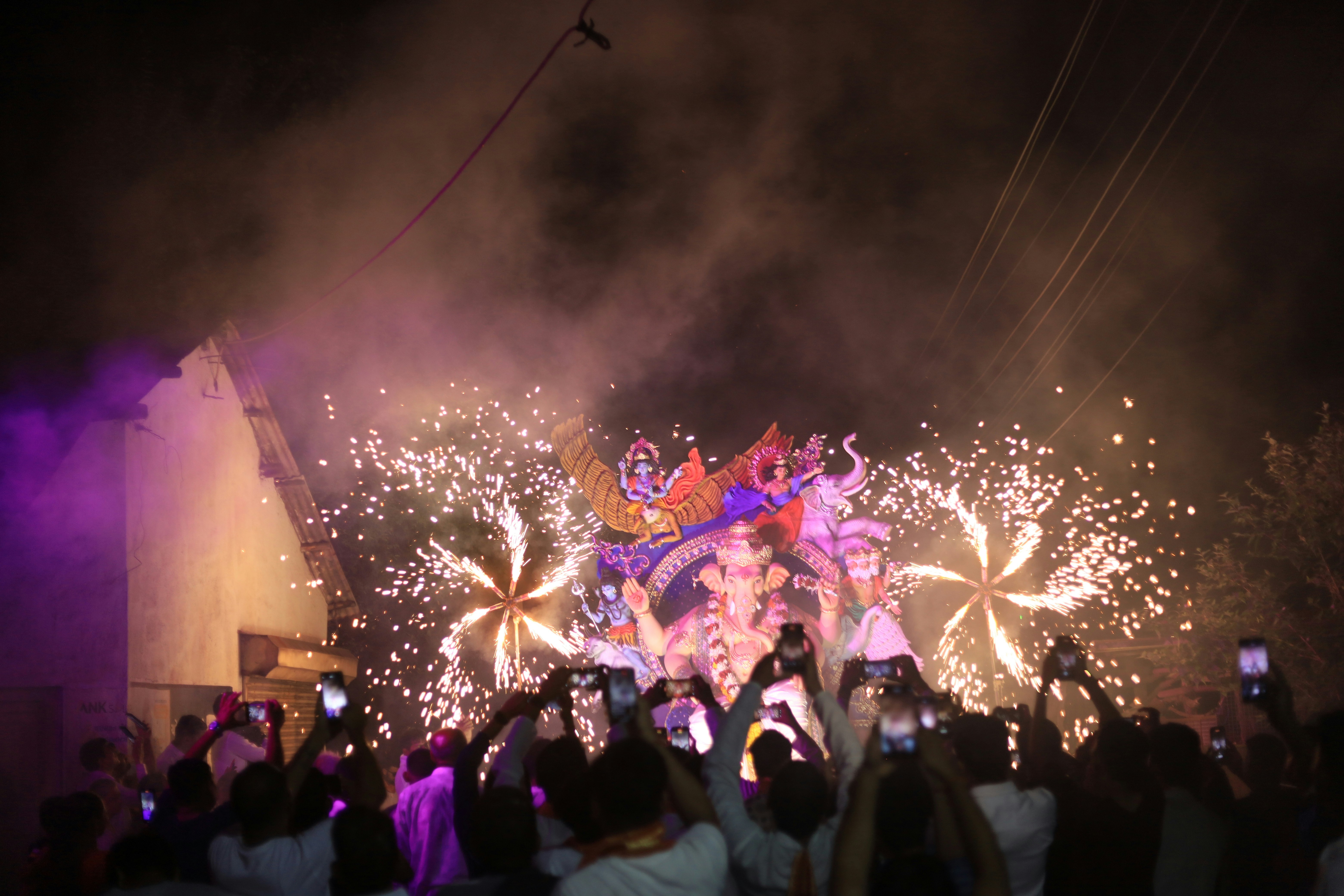 Midnight Parade: Fireworks Over a Celebratory Float