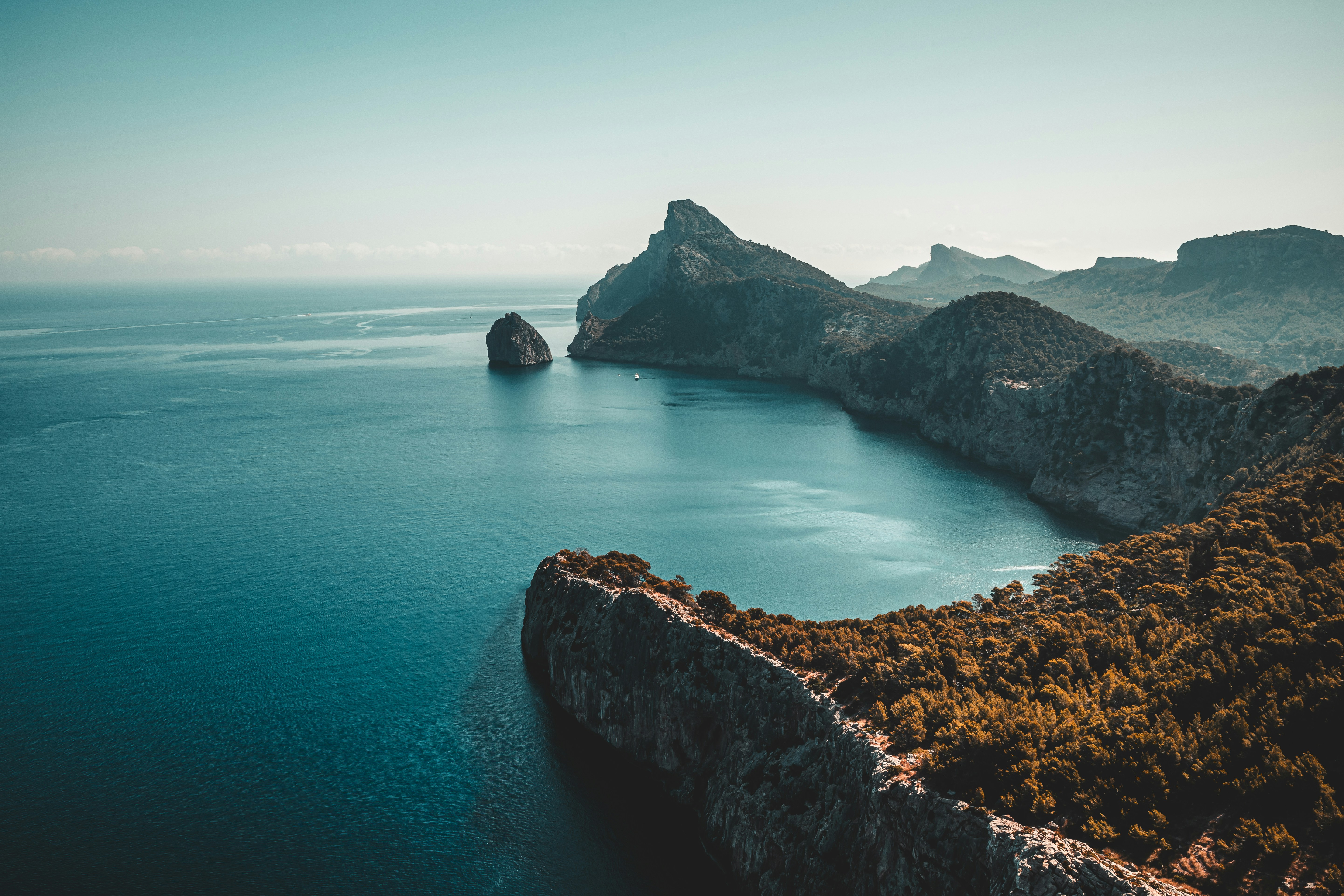 Cliffside Horizon: A Quiet Sea Carved by Stone and Light